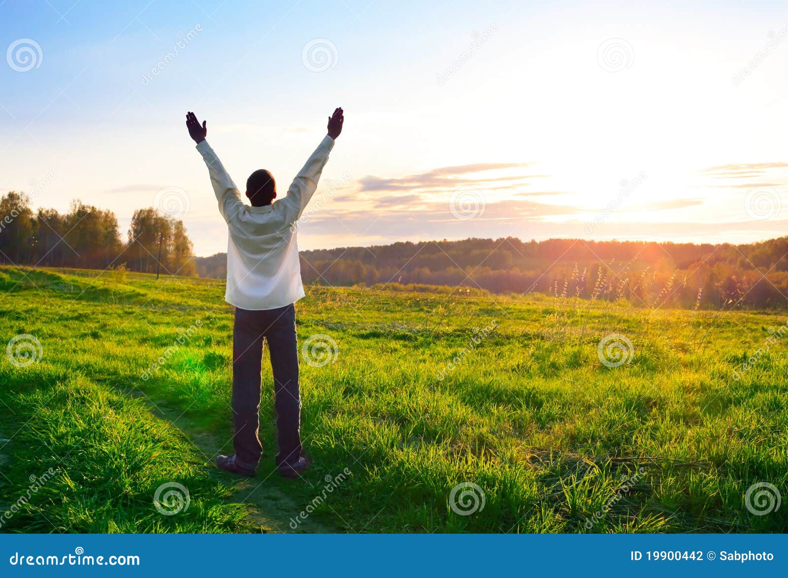 Praying man stock photo. Image of freedom, idyllic, hands - 19900442