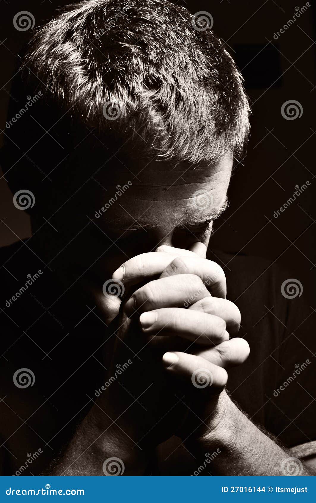 Praying man. stock photo. Image of faith, clasped, emotion - 27016144