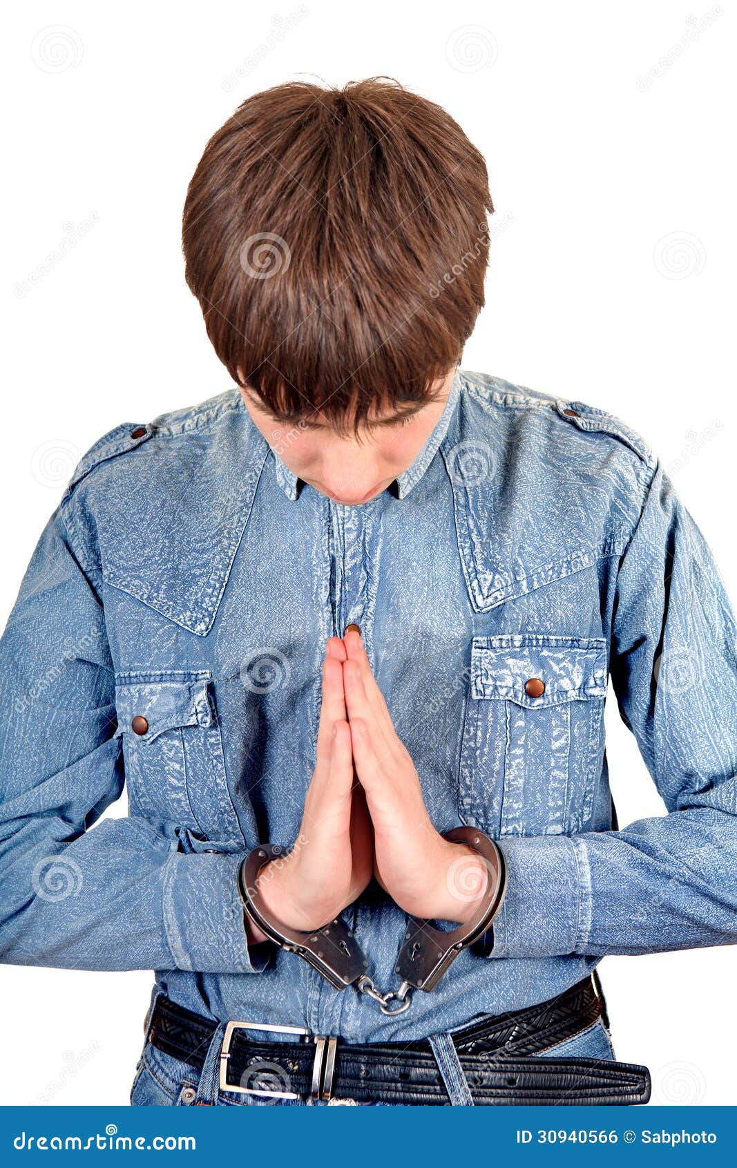 Praying Man In Handcuffs Stock Photo | CartoonDealer.com #30940566