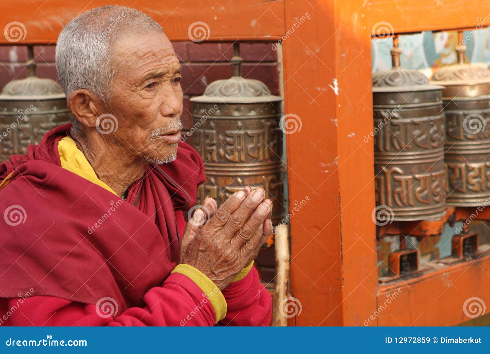 Praying man in Kathmandu editorial stock image. Image of mill - 12972859