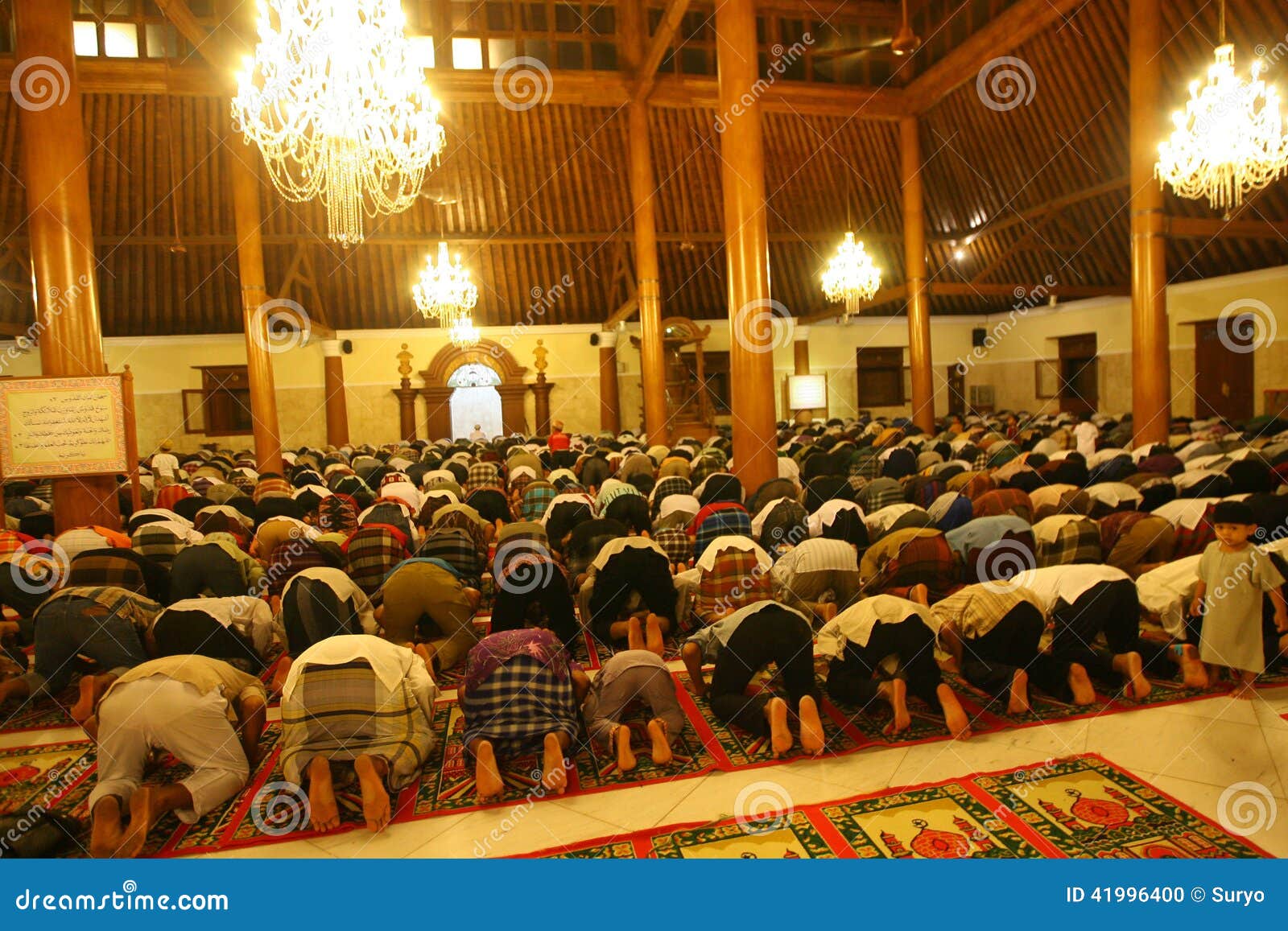Praying in the mosque editorial image. Image of city - 41996400