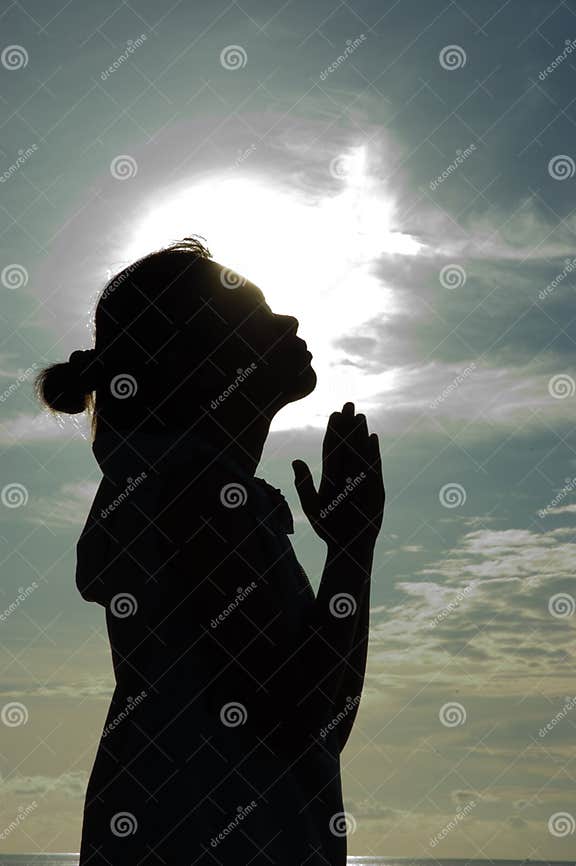 Praying at Sunrise stock image. Image of religion, women - 1292375