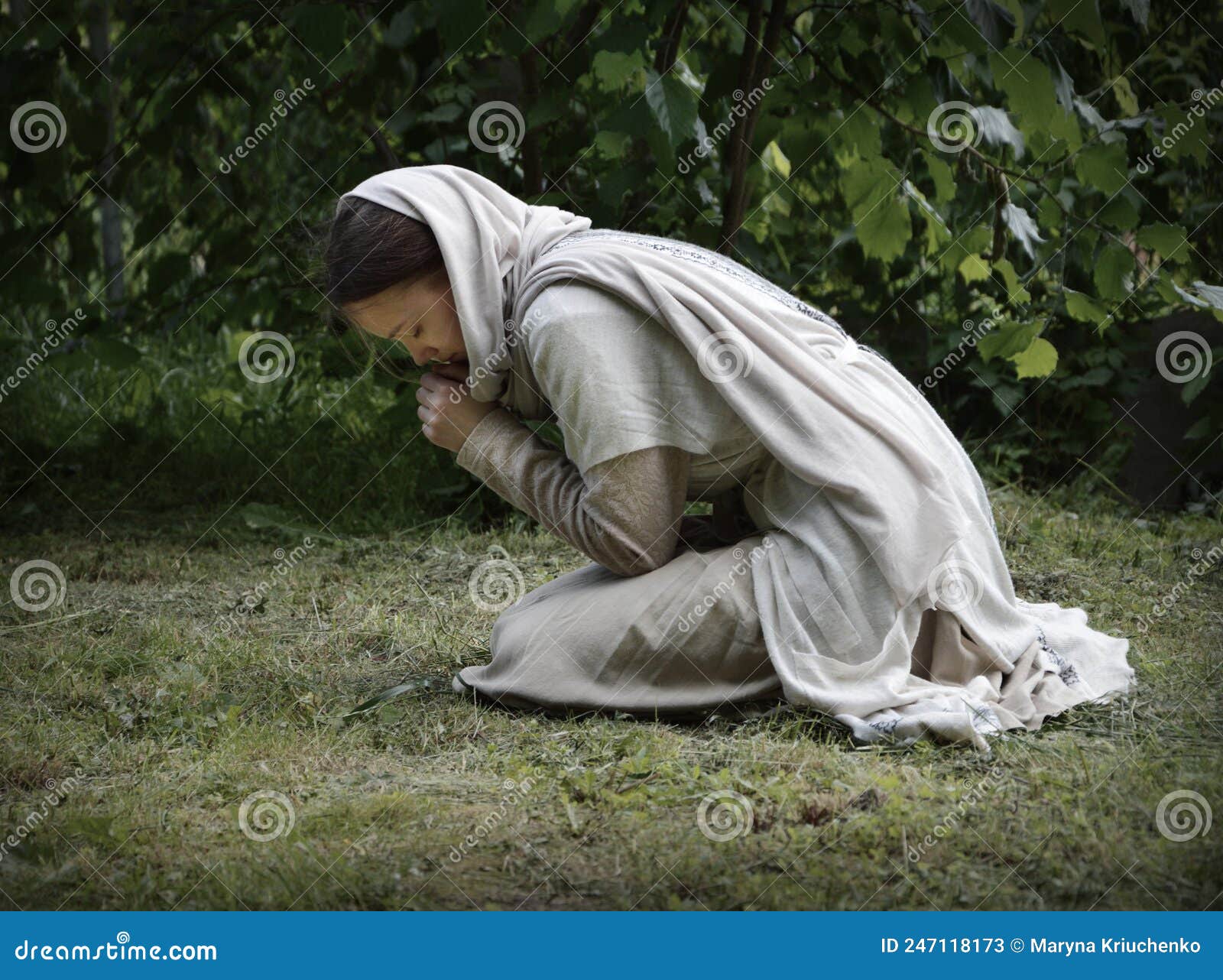 Praying Woman on Grass Lawn Stock Image - Image of forgiveness, alone ...