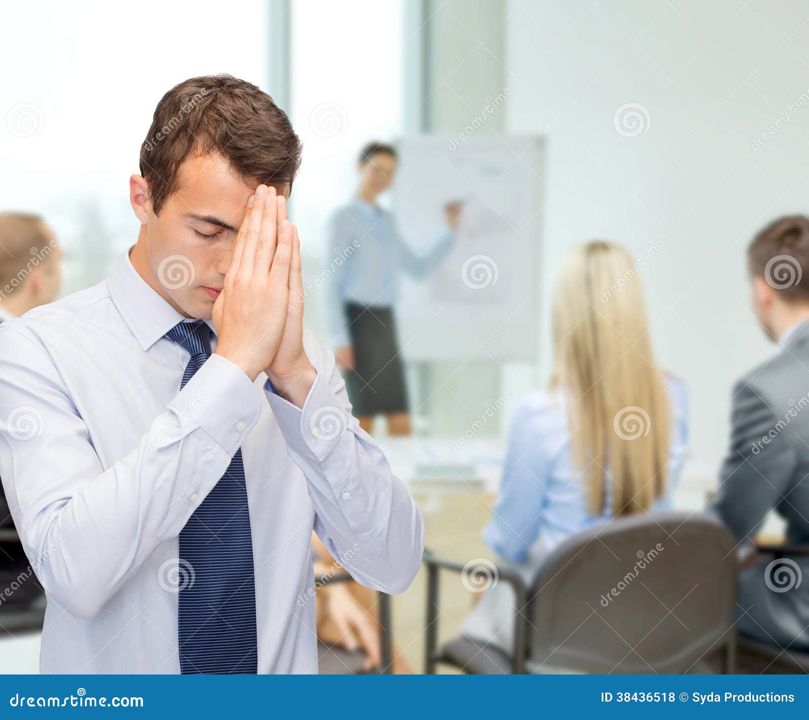 Praying Young Buisnessman at Office Stock Photo - Image of hispanic ...