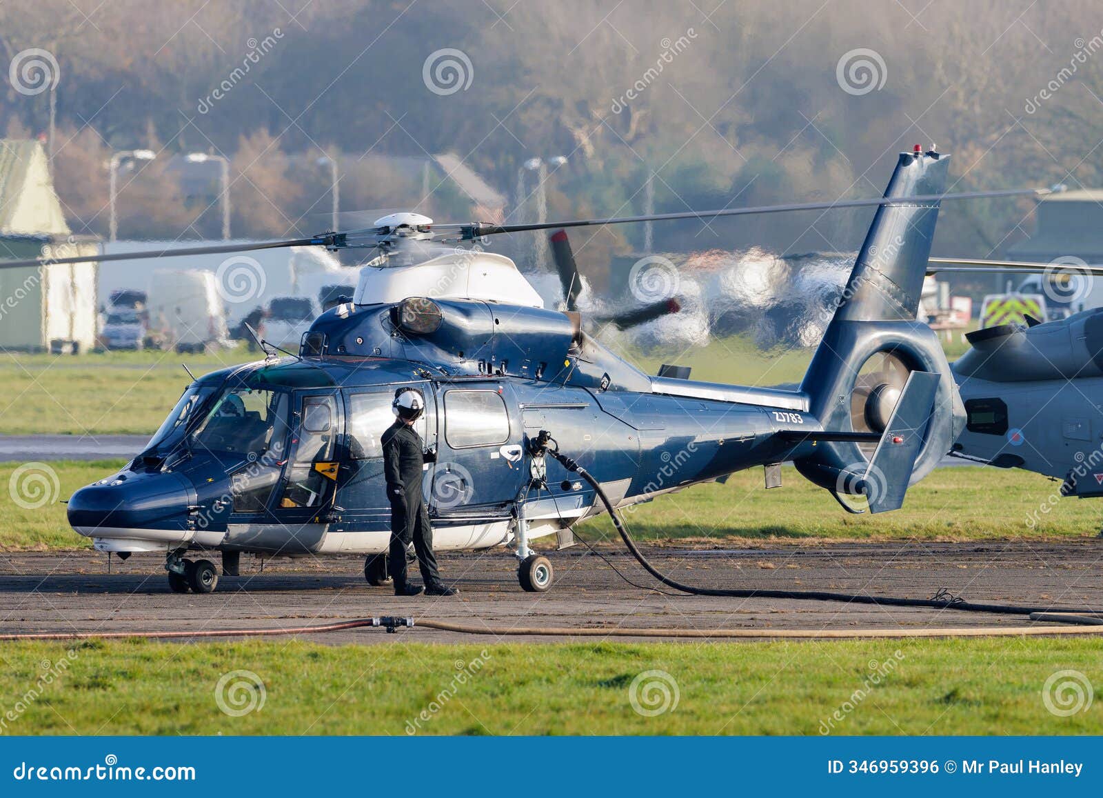 Pre-Flight Preparation: Helicopter Refueling in Action Editorial Photo ...