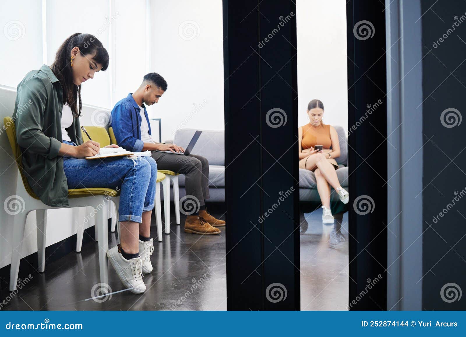 Pre Interview Process. Ta Group of People Using Their Devices while ...