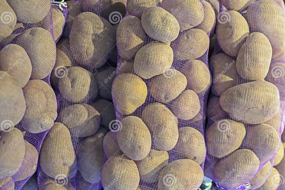 Pre-packed Varietal Potatoes in Nets in the Supermarket. Stock Photo ...