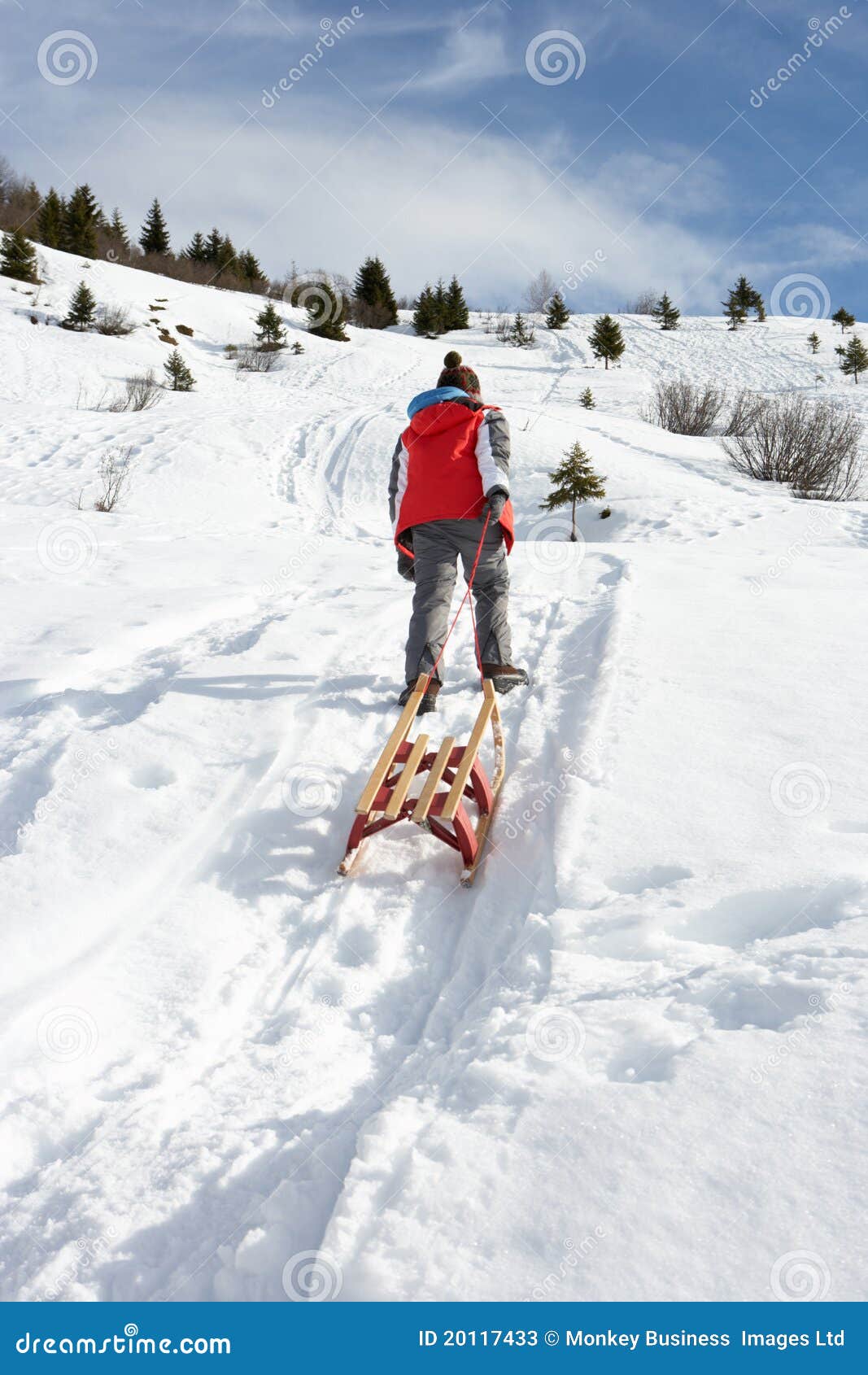 Pre-teen Boy Pulling a Sled in the Snow Stock Image - Image of ...