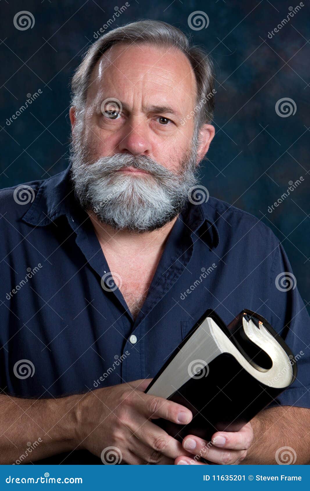 Preacher Holding Rolled Bible Stock Image - Image of bearded, religious ...