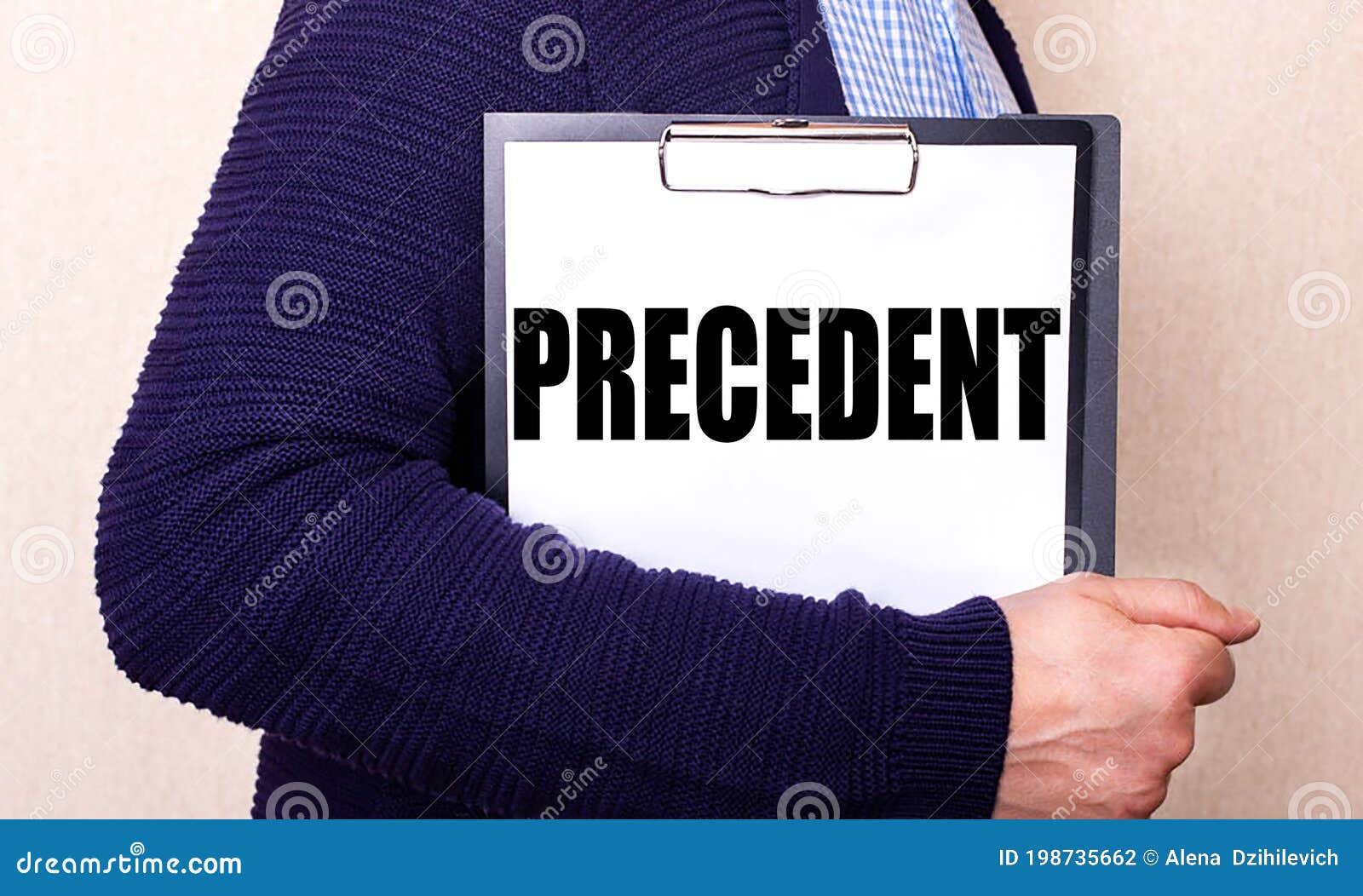The PRECEDENT is Written on a White Sheet Held by a Man Standing ...