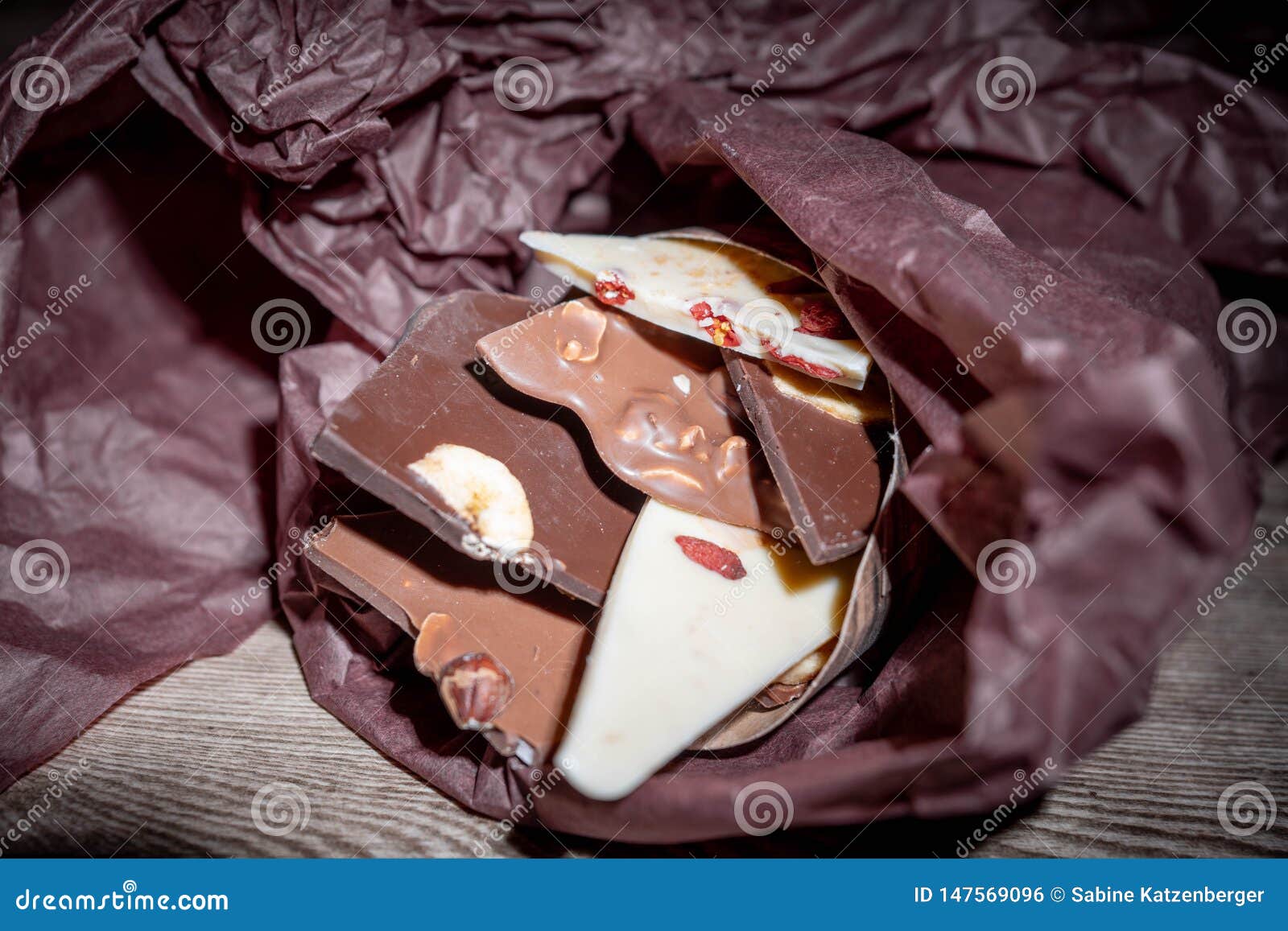 Precious Chocolate in Paper Stock Photo - Image of cacao, group: 147569096