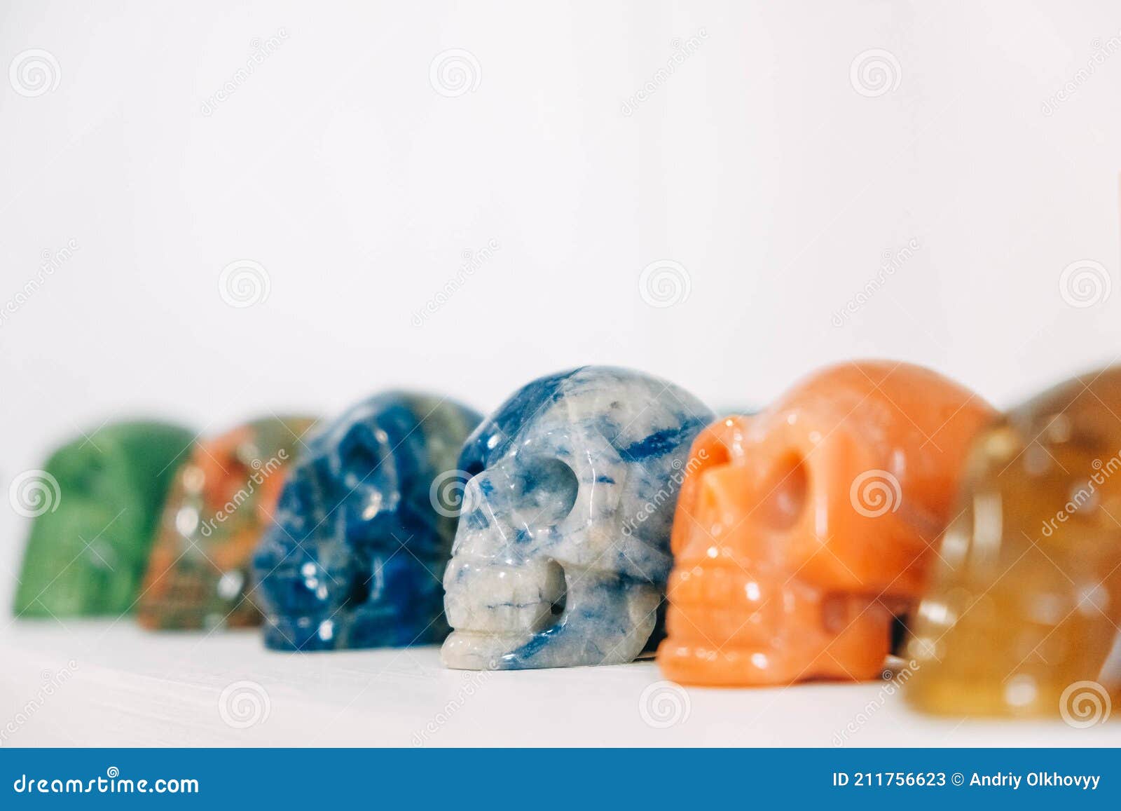 Precious Colored Stones in the Form of Skulls on a White Background ...