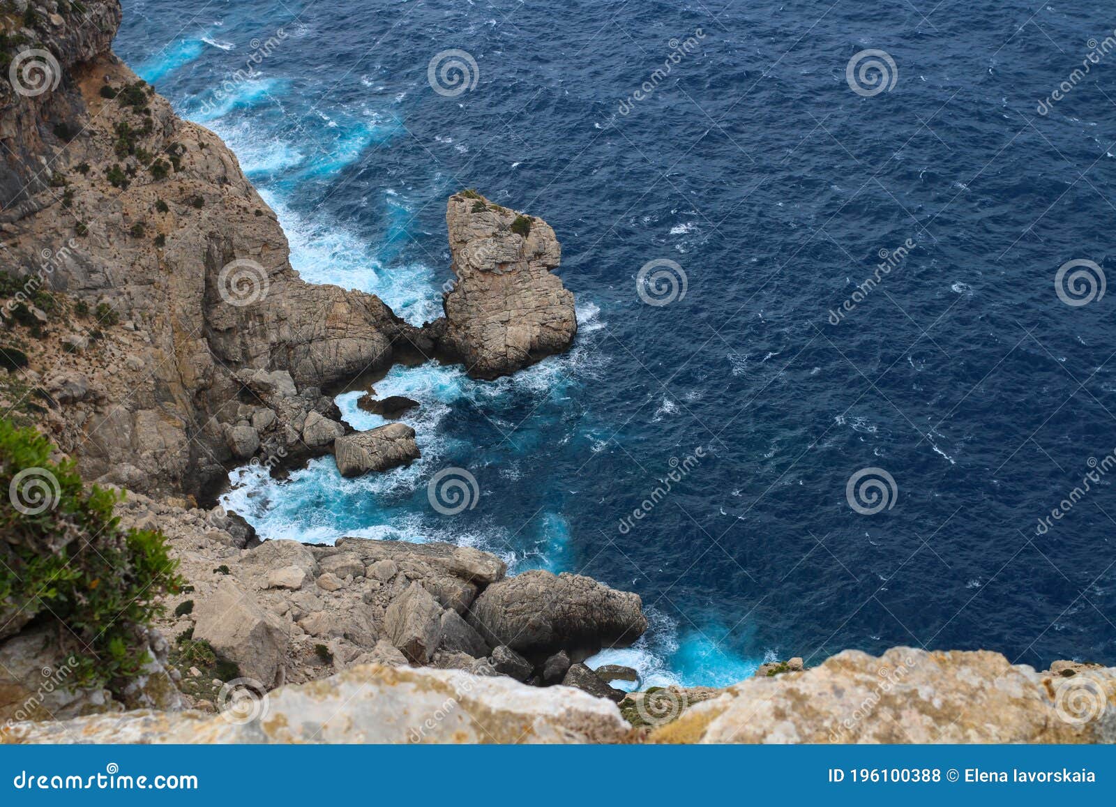 On a Precipice. View from the Cliff on the Waves Breaking on the Shore ...