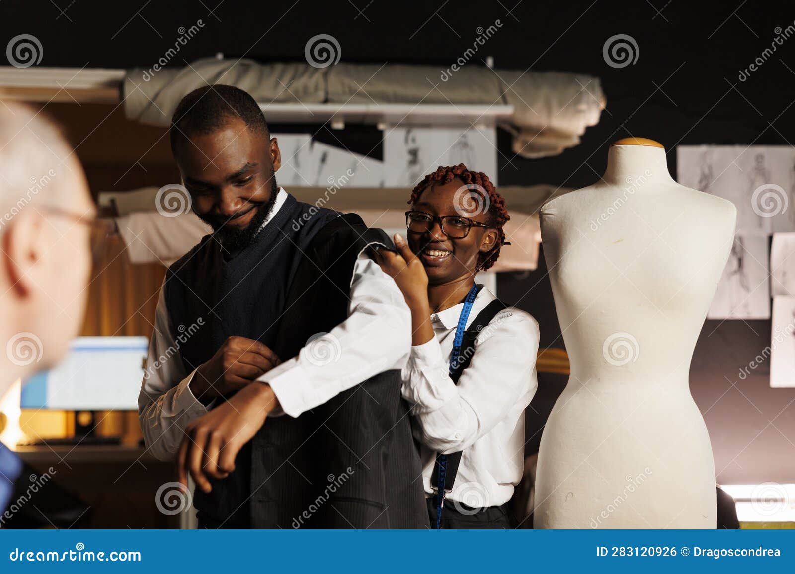 Couturier Finishing Comissioned Suit Stock Image | CartoonDealer.com ...