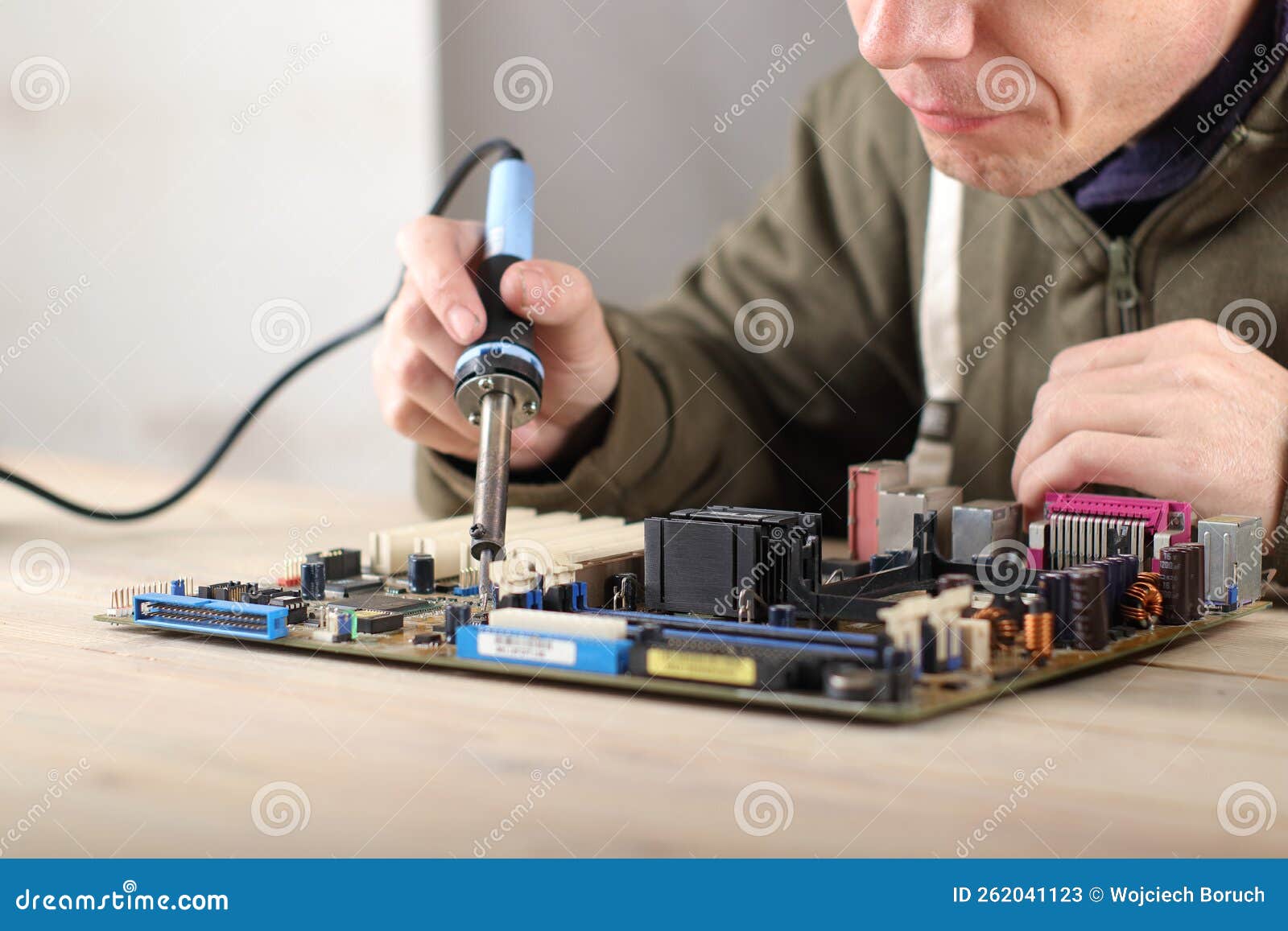Precise Soldering of the Computer Motherboard on the Table Stock Image ...