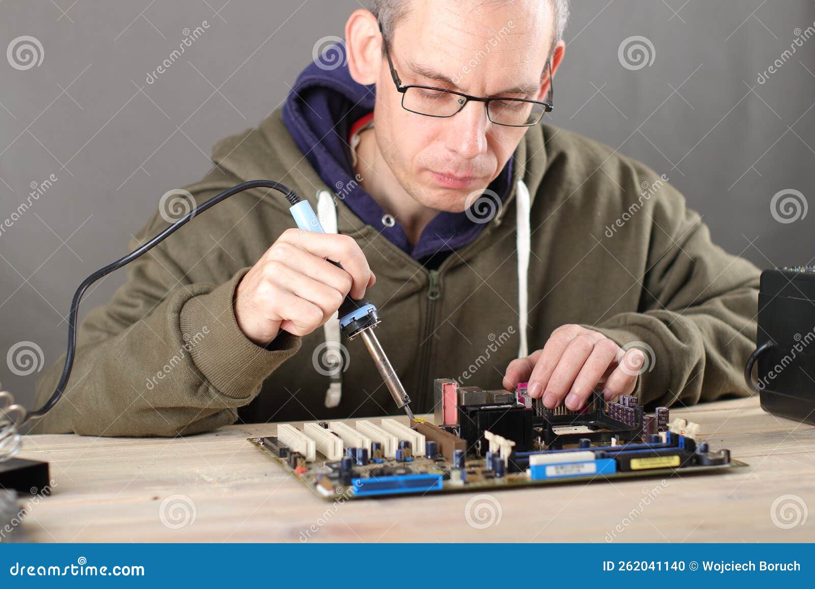 Precise Soldering of the Computer Motherboard on the Table Stock Photo ...