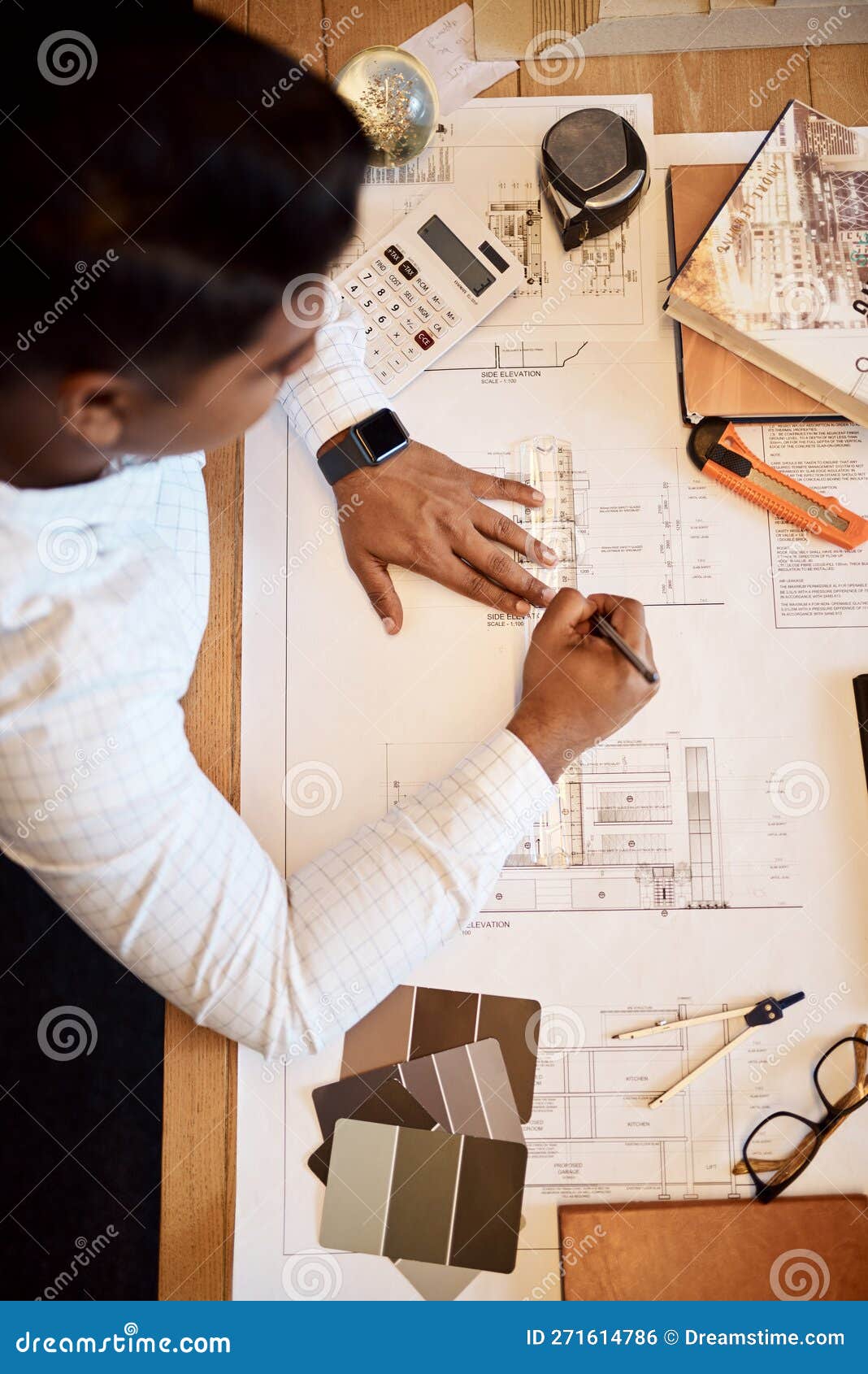 With Precision Comes Perfection. High Angle Shot of an Architect Using ...