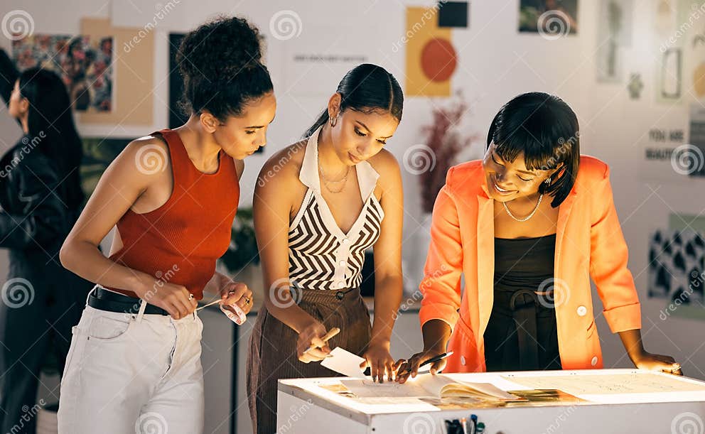 Precision Meets Pretty. a Group of Designers Collaborating at a ...