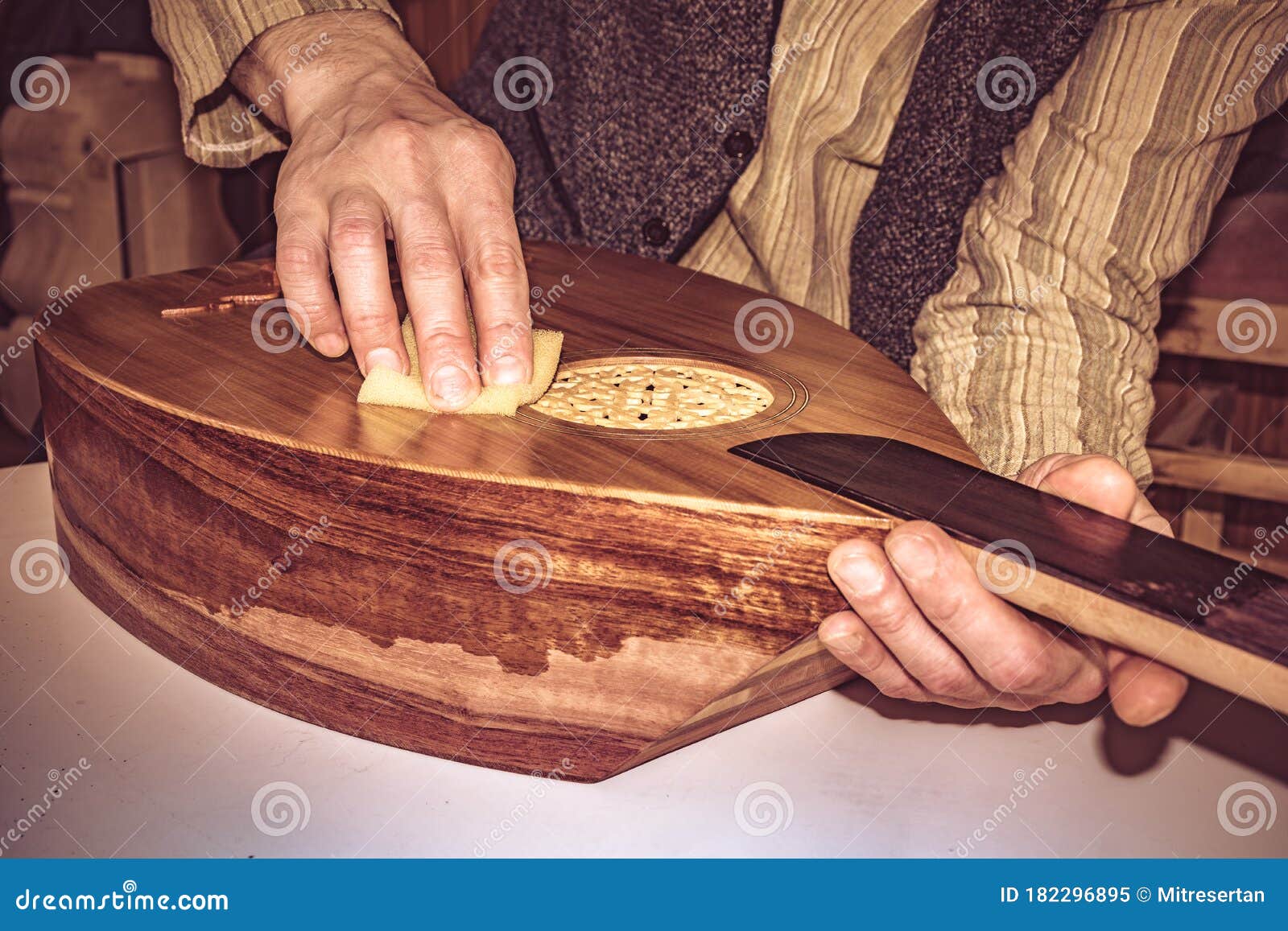Closeup Scene of a Precision Process for Building a Stringed Musical ...