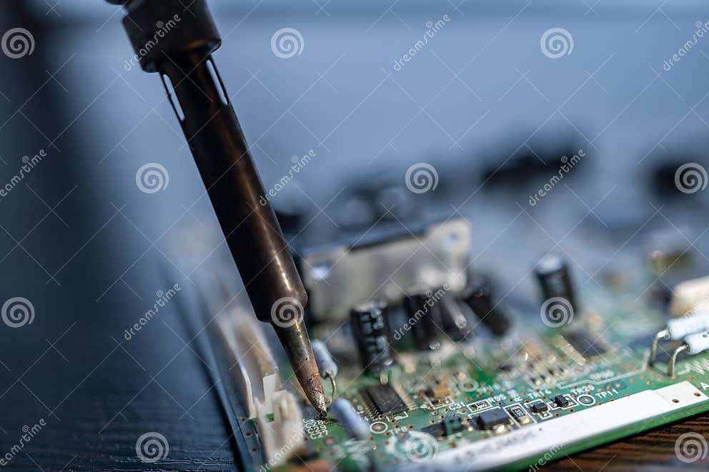 Precision Soldering on Electronics Stock Photo - Image of device ...