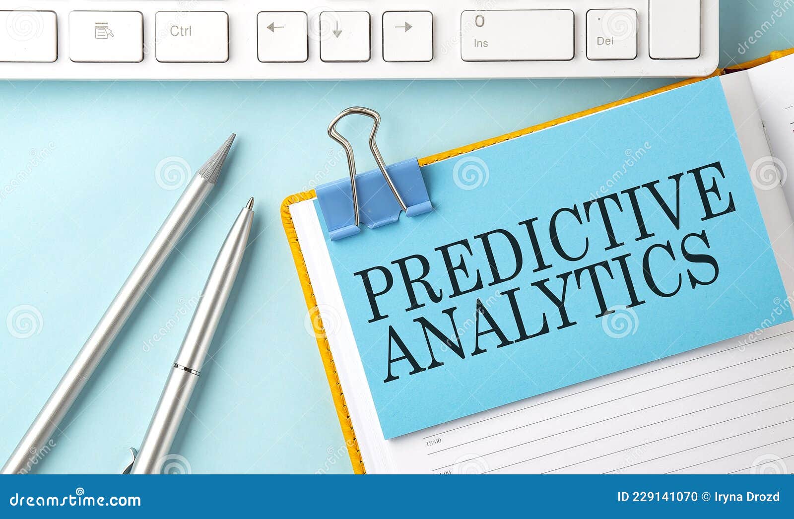 Predictive Analytics Text on Sticker on the Blue Background with Pen ...