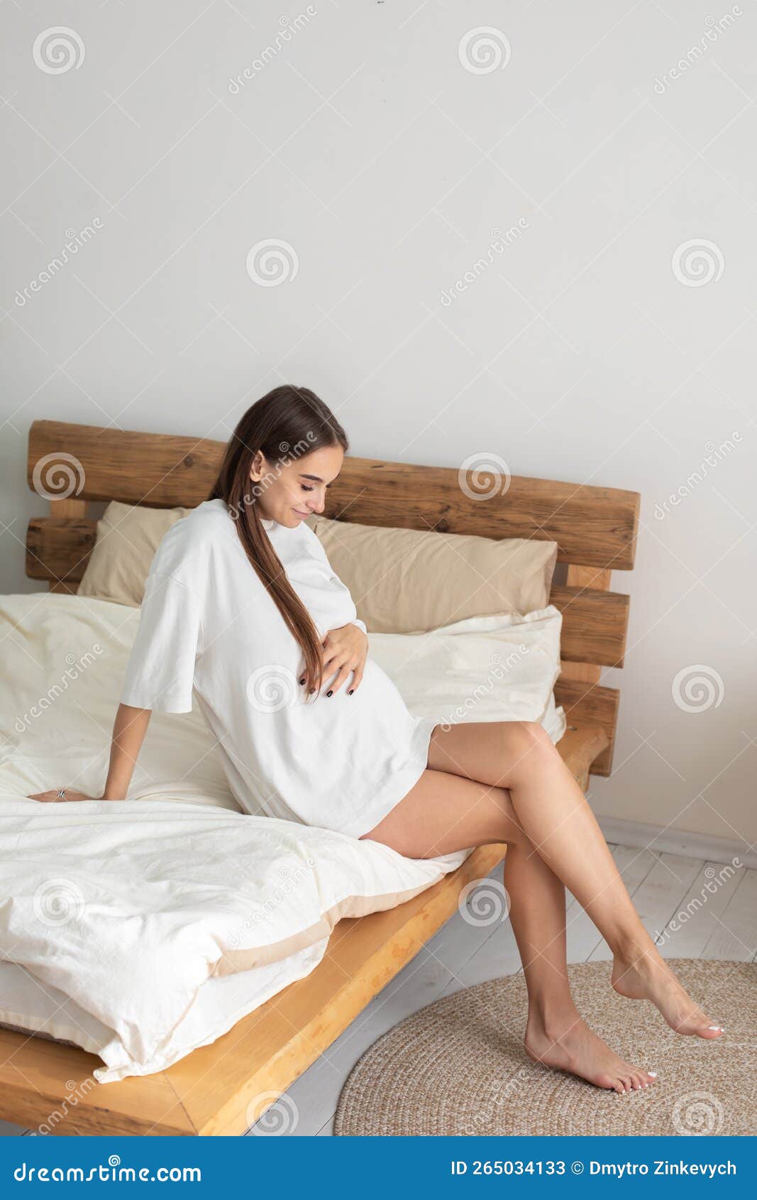 Long Haired Pregnant Woman Sitting On The Bed Stock Image Image Of