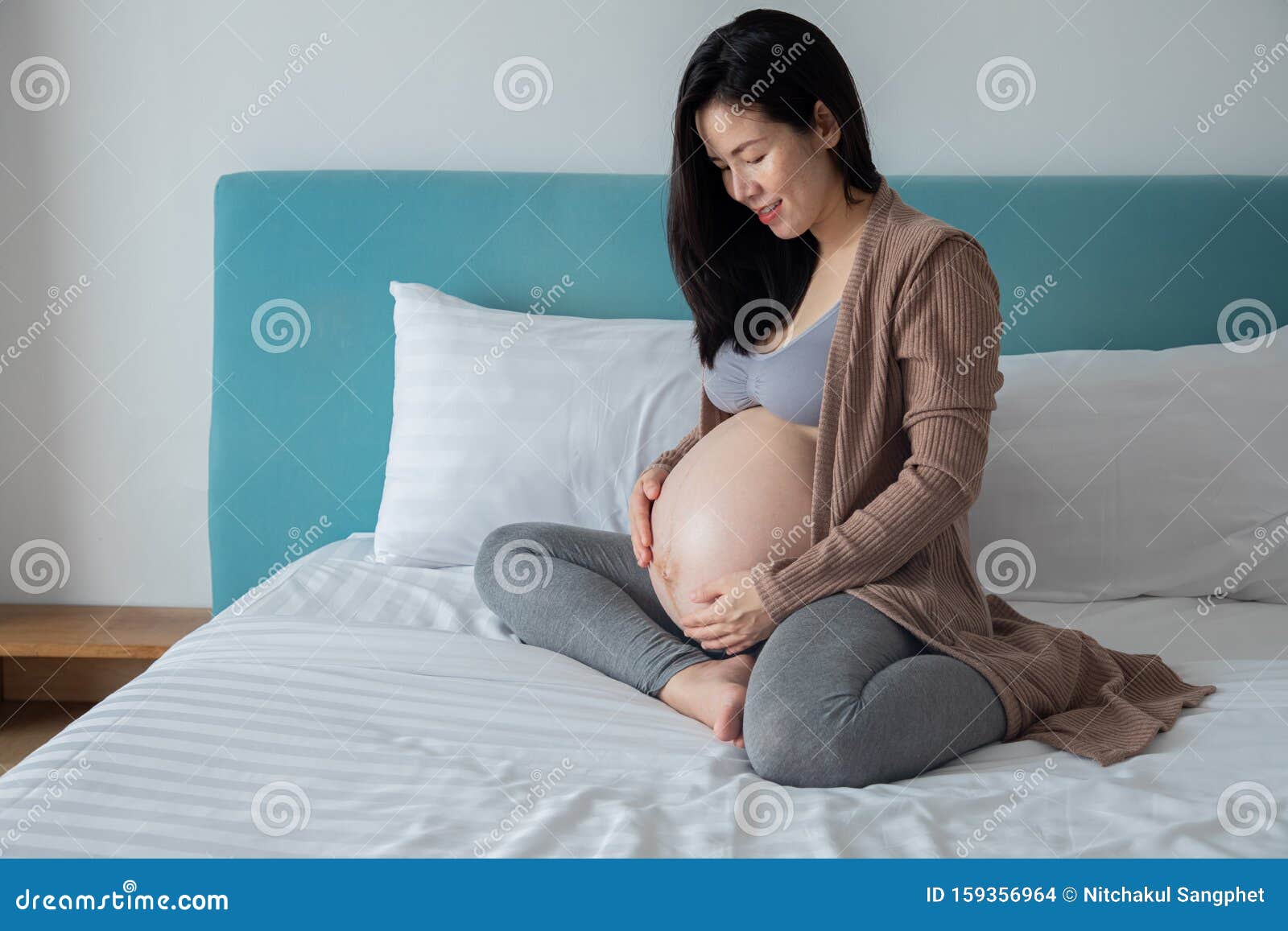 Pregnancy Motherhood And Expectation Concept Smiling Asian Pregnant