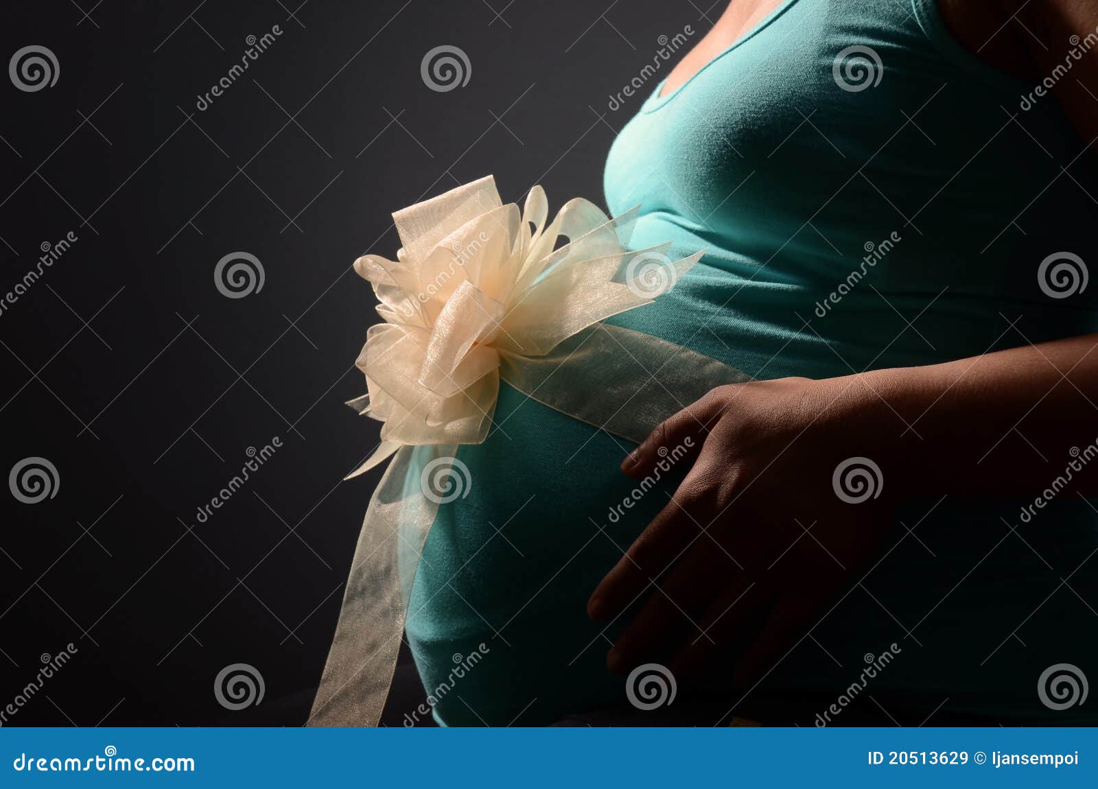 Pregnant belly with ribbon stock image. Image of life - 20513629