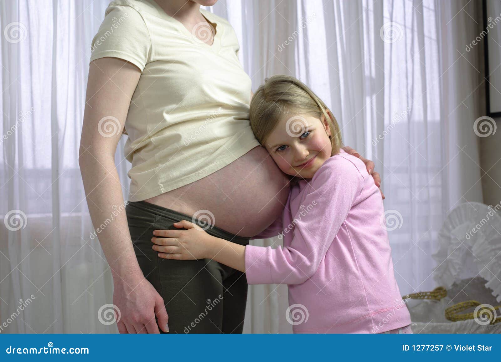 Pregnant hug stock image. Image of family, hugging, expectation - 1277257