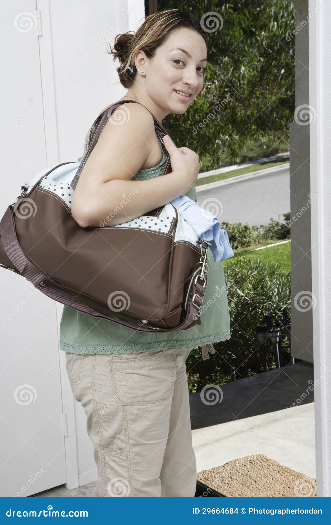 Pregnant Woman Exiting Home Stock Photo - Image of maternity, pregnancy ...