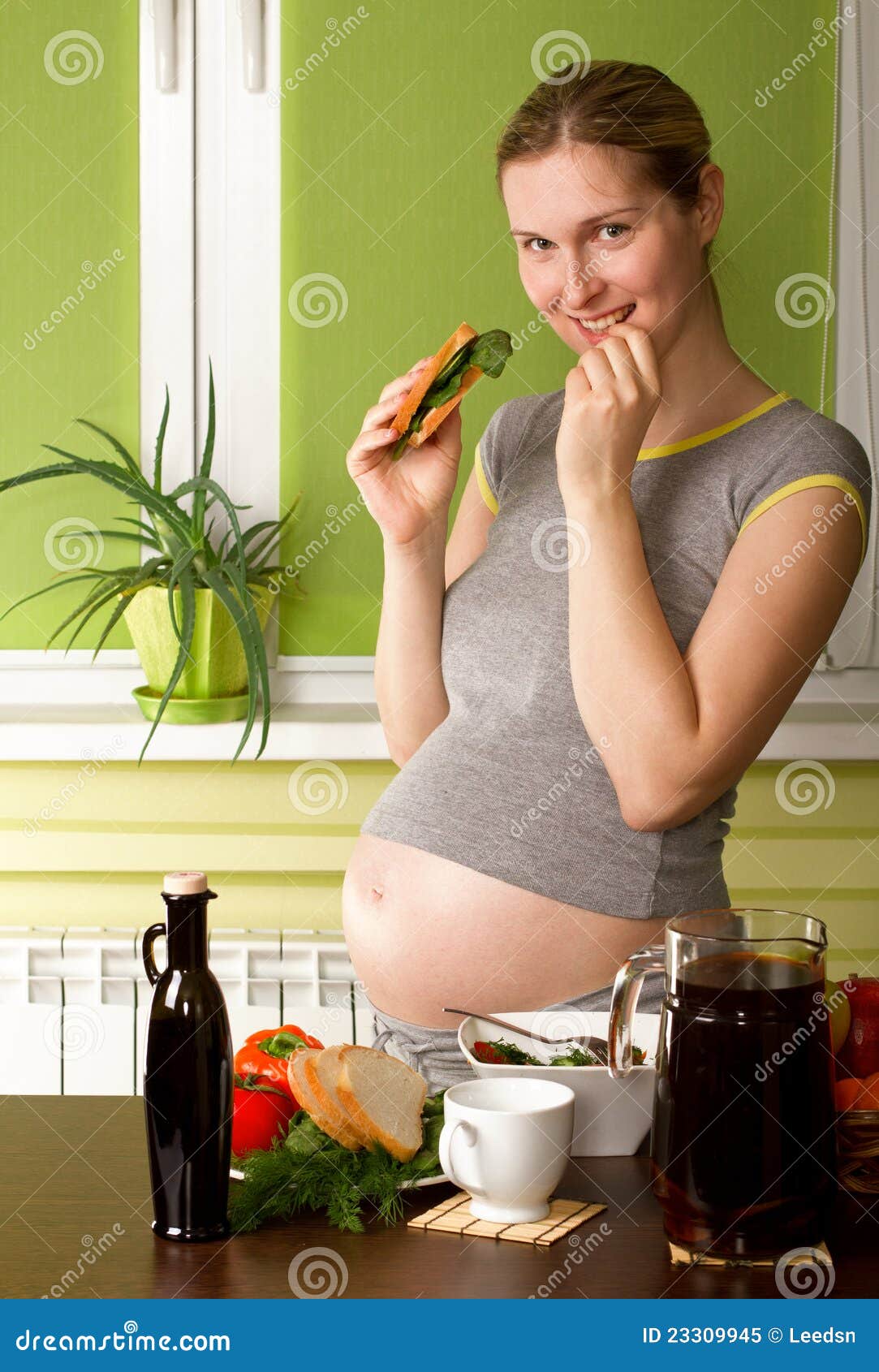 Pregnant Woman on Kitchen stock image. Image of diet - 23309945