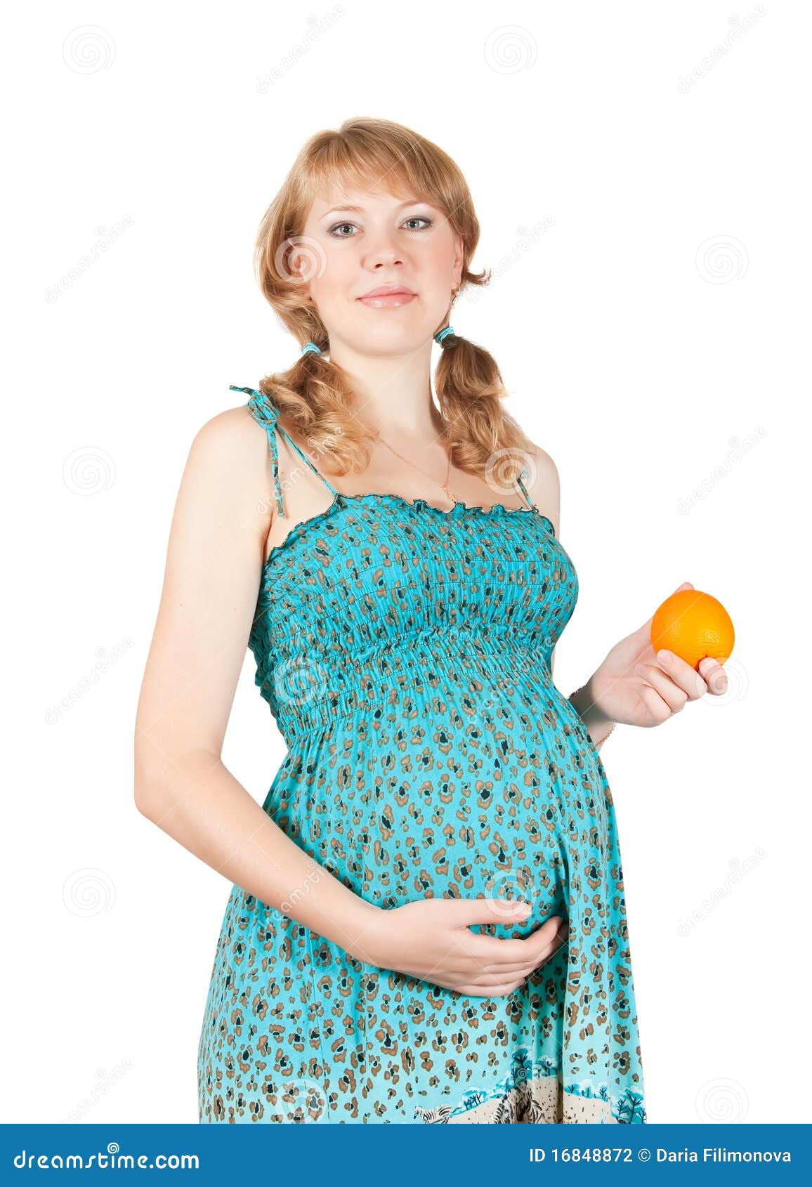 Pregnant woman with orange stock photo. Image of human - 16848872
