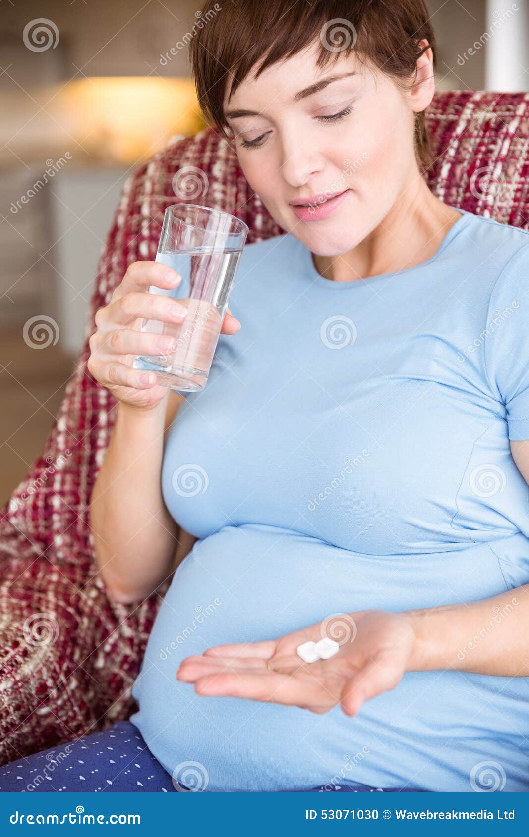 Pregnant Woman Taking a Vitamin Tablet Stock Photo - Image of brunette ... Pregnant Woman Taking a Vitamin Tablet Stock Photo - Image of brunette ...