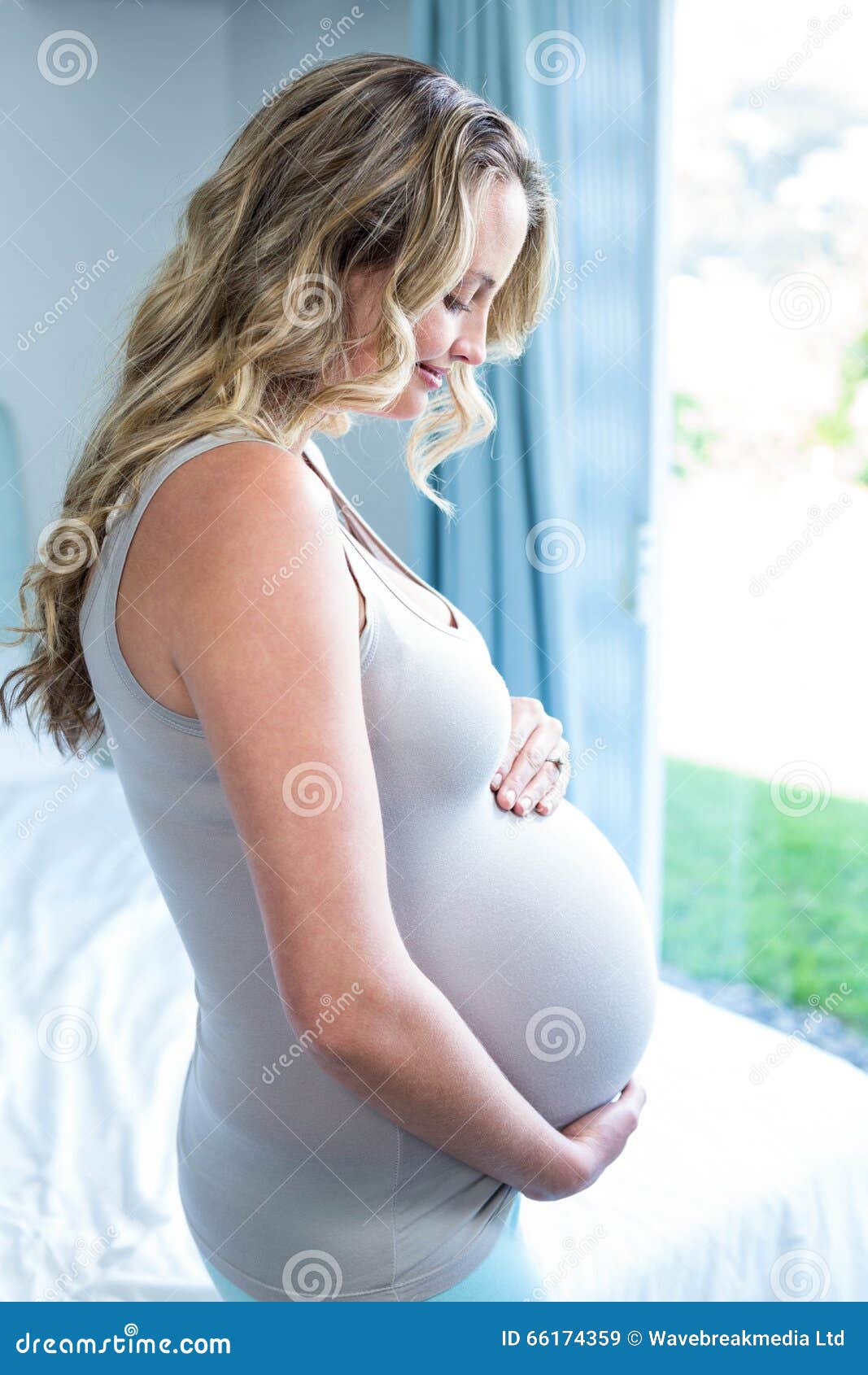Pregnant Woman Touching Her Belly Stock Image Image Of House Pajamas