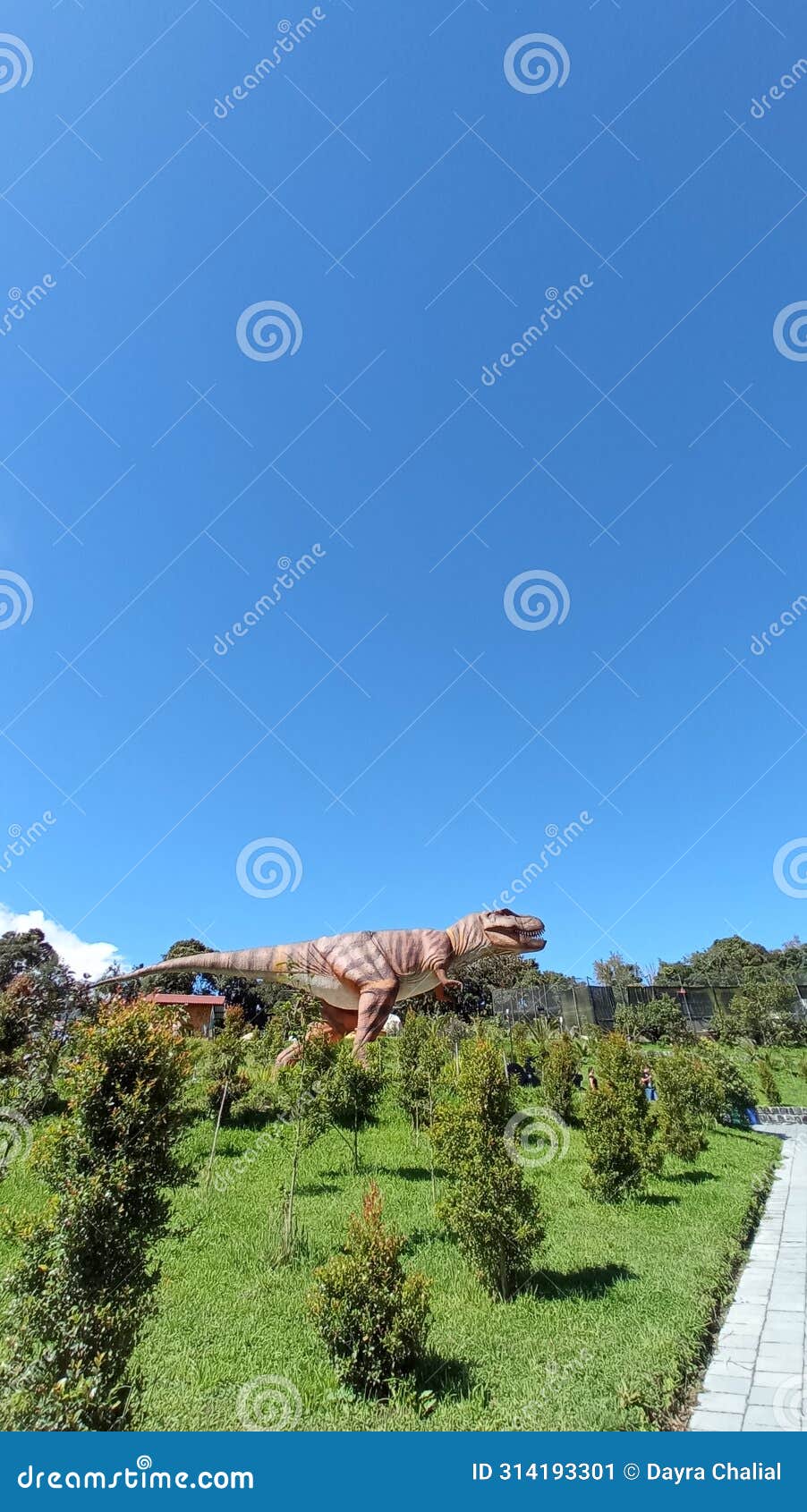 Prehistoric Dinosaur in a Theme Park Stock Image - Image of rock, ridge ...