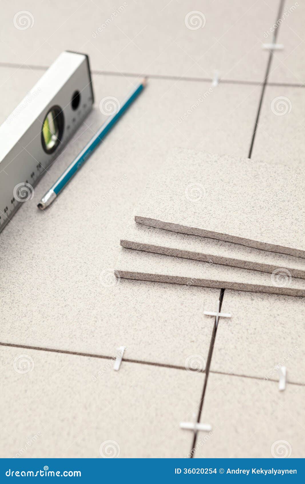 A Marking Tiles For Cutting With An Electric Tile Cutter Royalty-Free ...