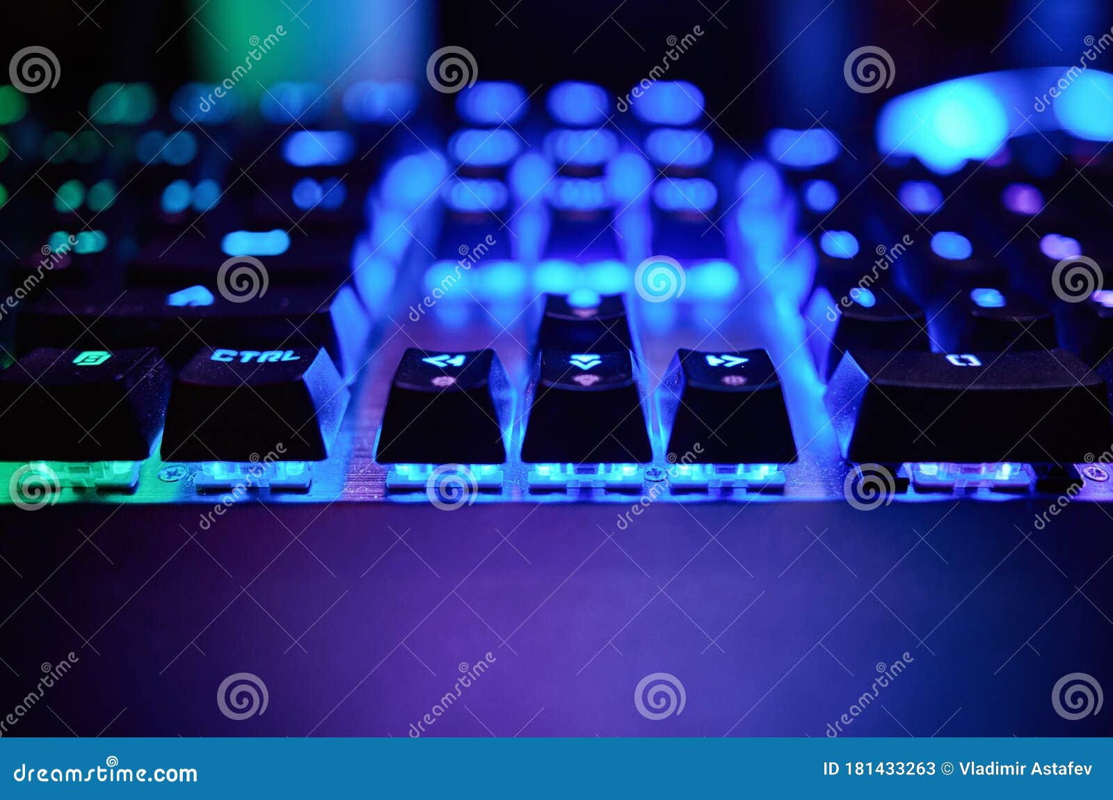 Premium Gaming RGB LED Backlit Keyboard. Mostly Blue and Purple. Front ...