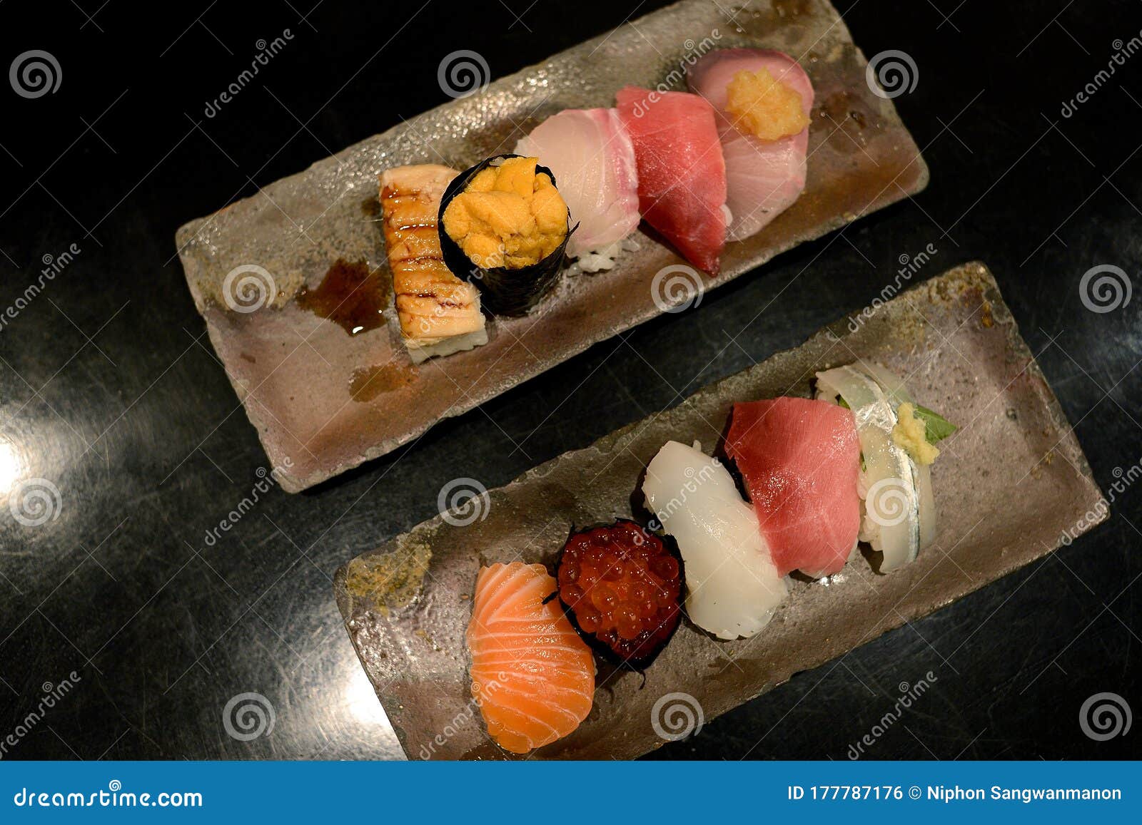 The Premium Sushi Set is Placed on a Black Stone Plate. View from Above ...
