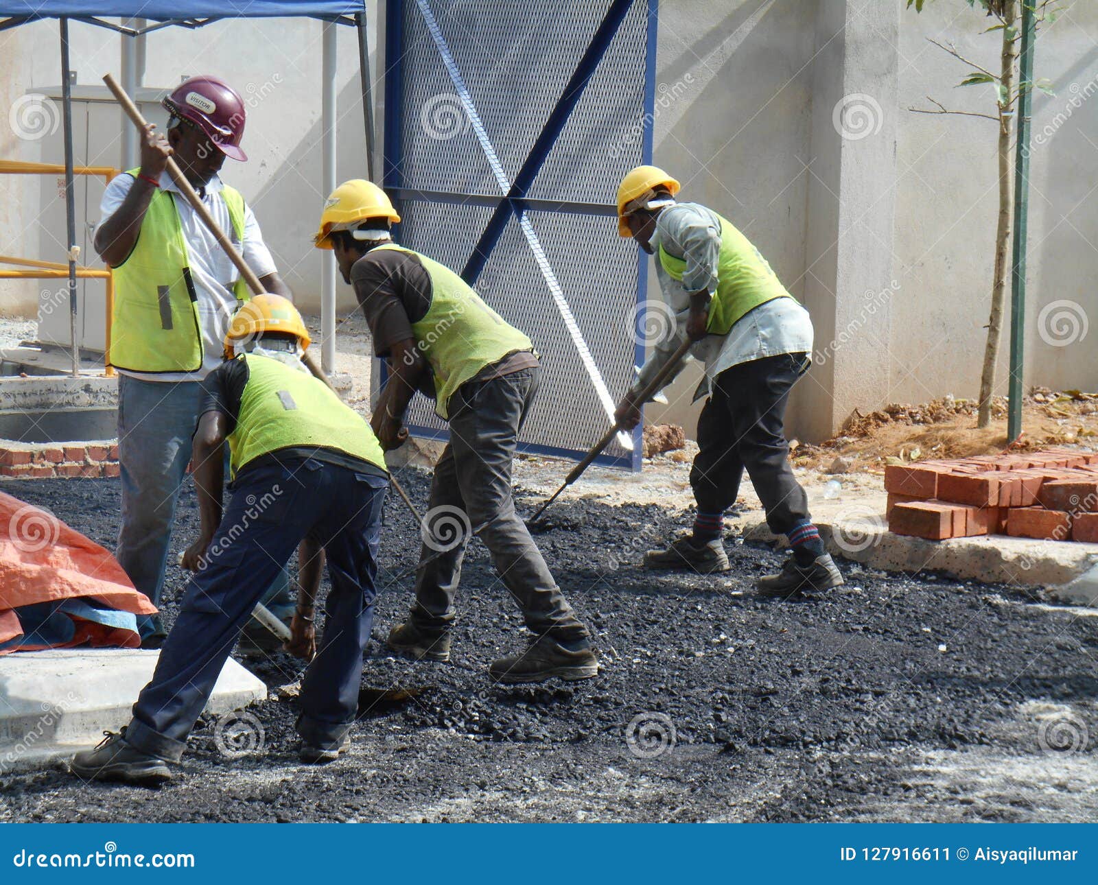 Premix Work by Construction Workers. Editorial Photo - Image of leveled ...