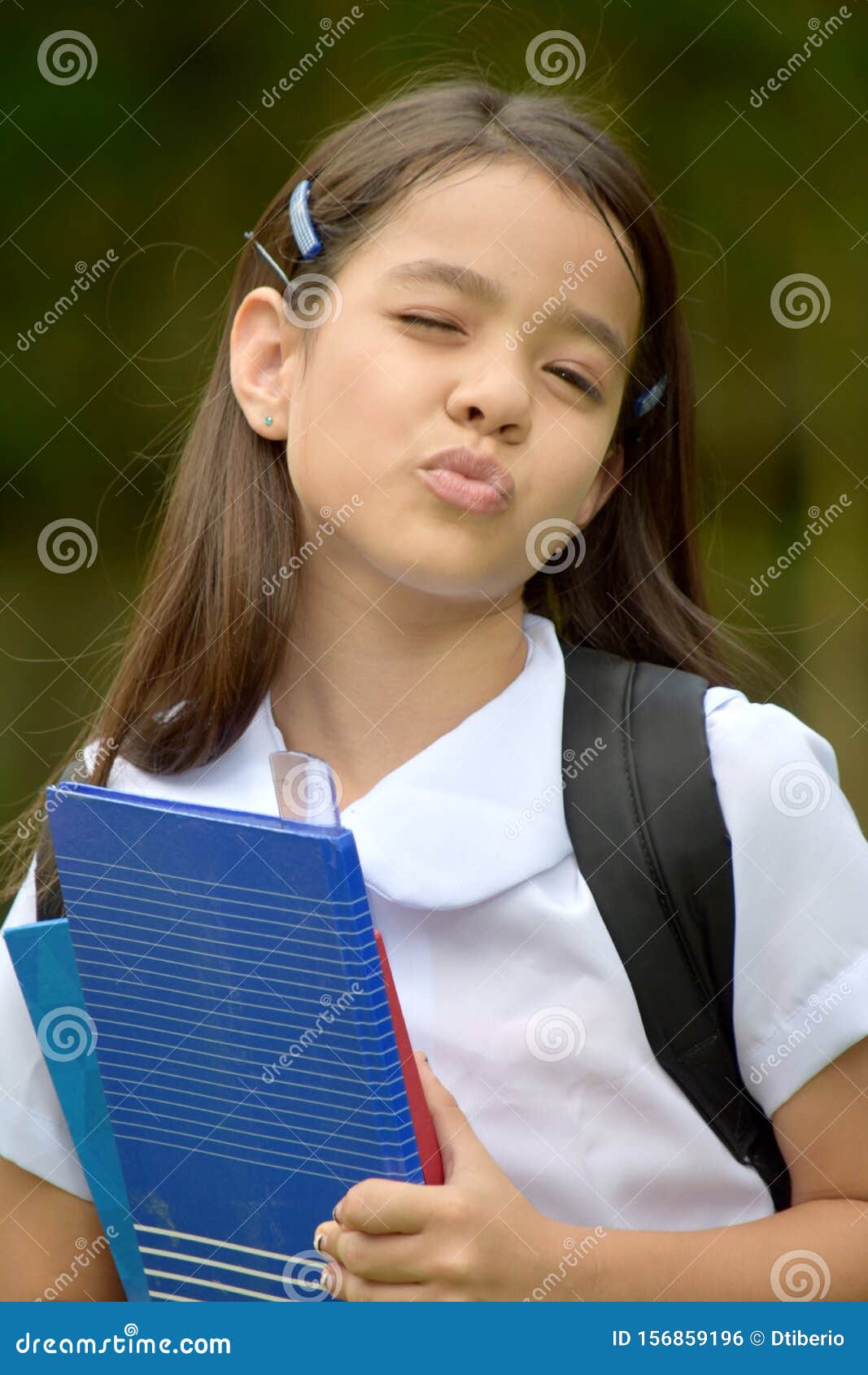 Prep Girl Student Winking with Books Stock Photo - Image of preparatory ...