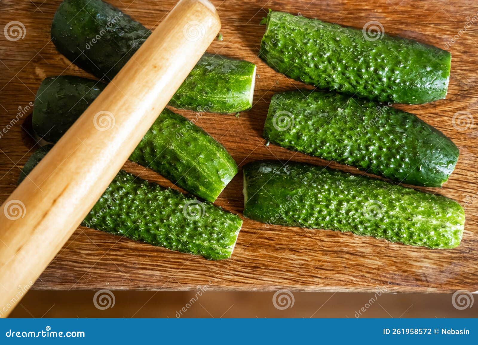 Preparation of Beaten Cucumbers. Halves of Fresh Cucumbers on a Cutting ...