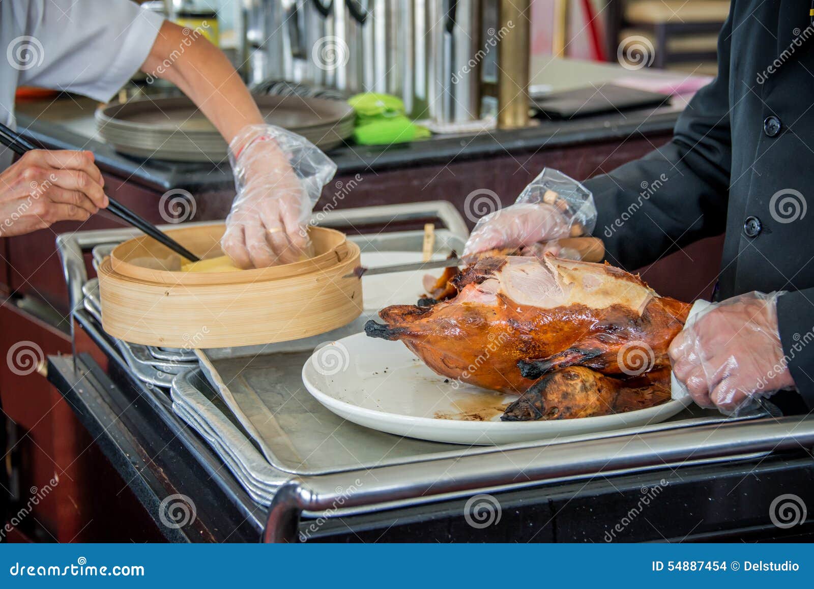Preparation of a Beijing Duck Stock Photo - Image of chef, chinese ...