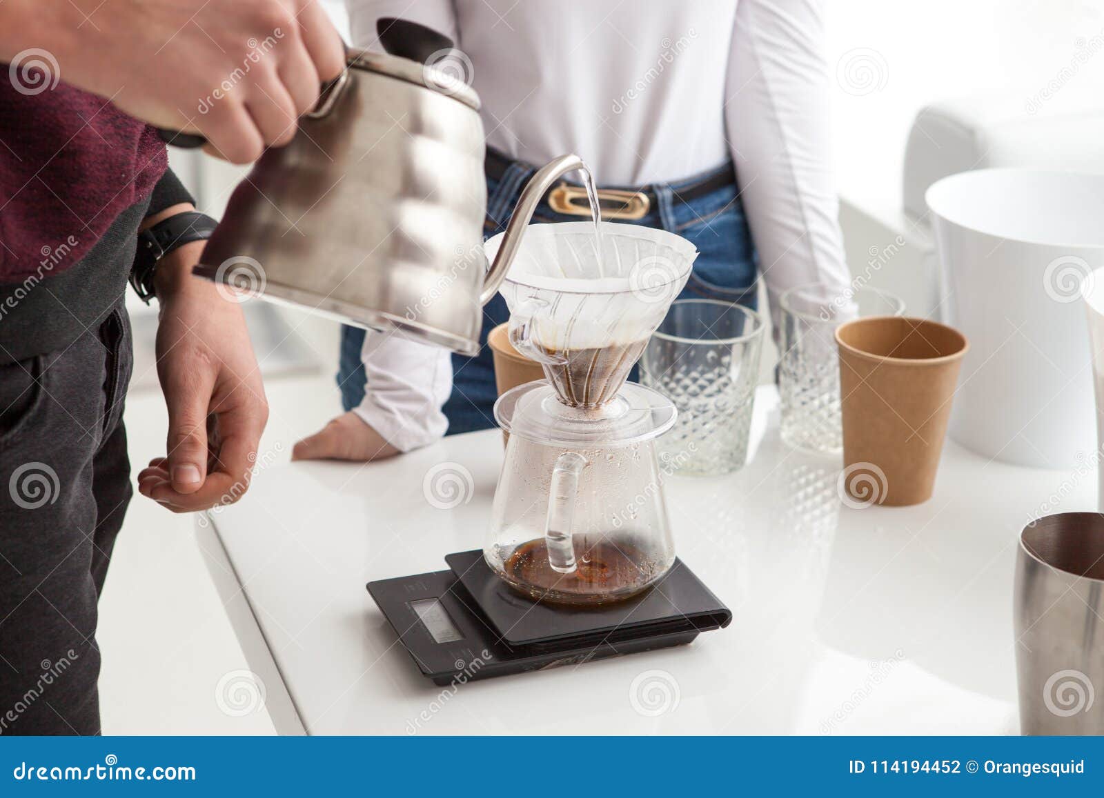 A Man is Preparing Coffee by a Method of Transfusion. Stock Photo ...