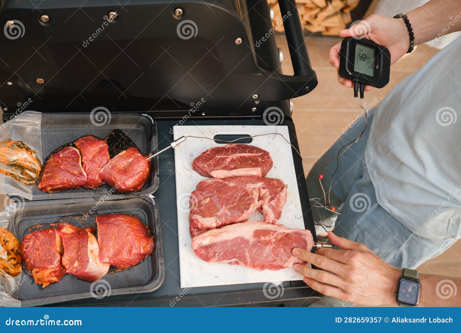 Preparation for Cooking Meat on an Open Grill with Temperature Check ...