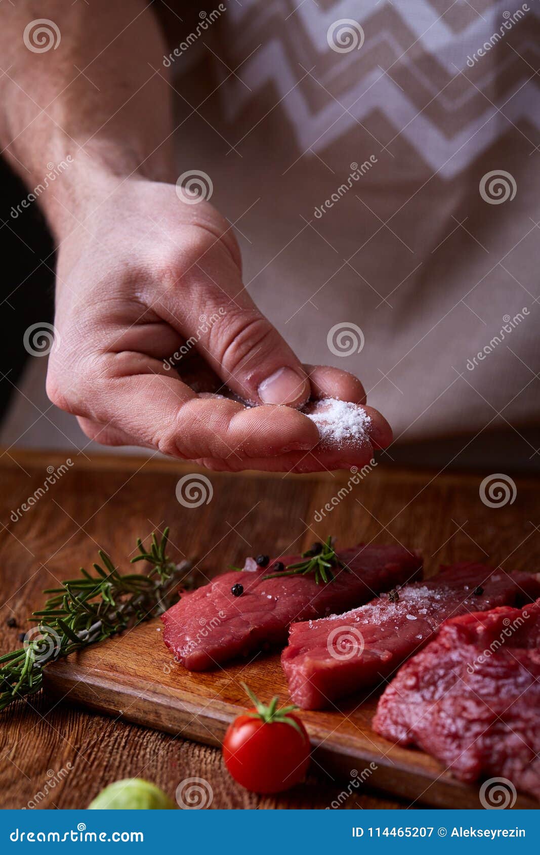 Strong Professional Man`s Hands Spilling Salt on Raw Beefsteak ...