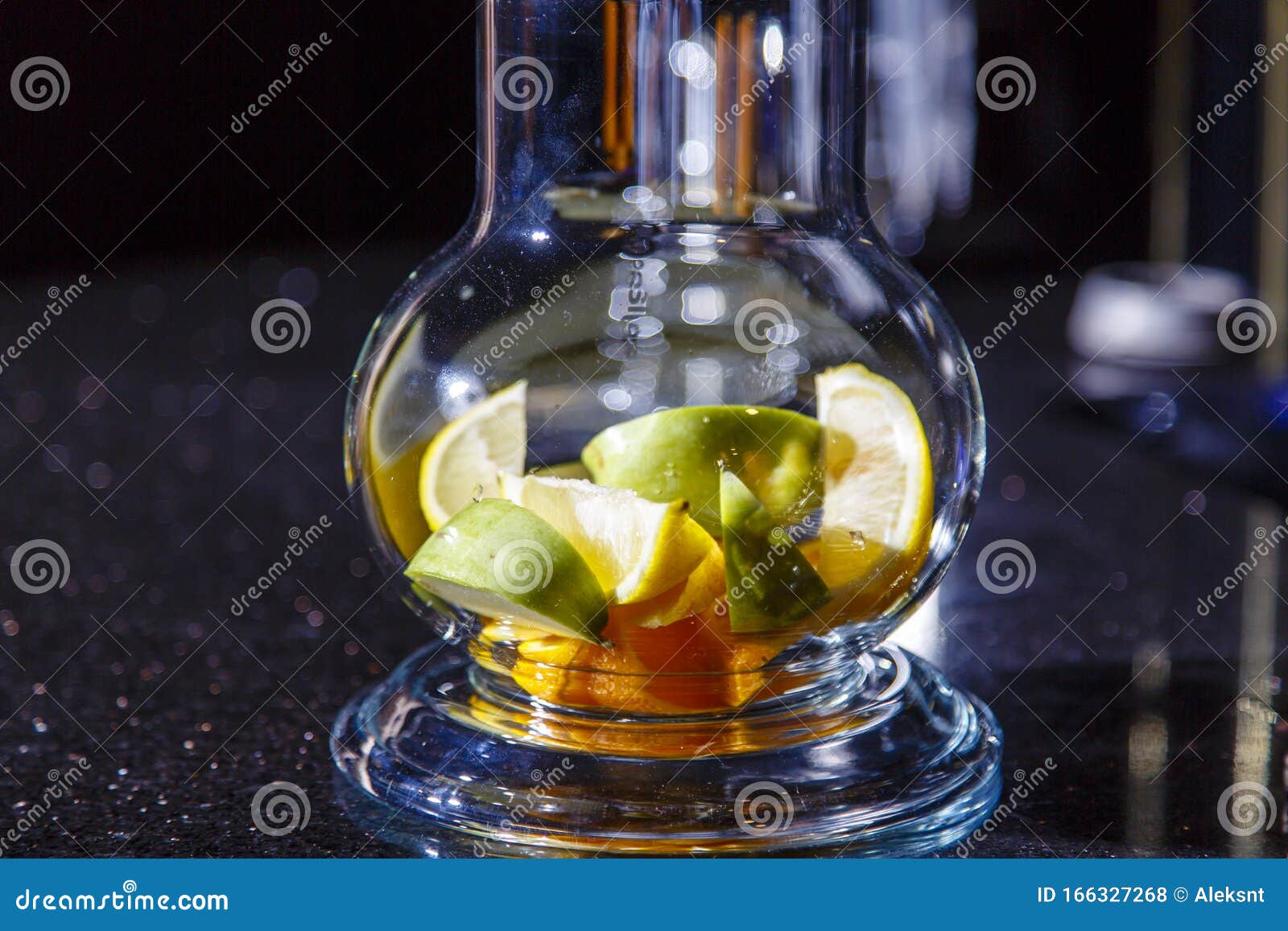 Preparation Of Hookah. Transparent Hookah Flask, In Which Are Cut ...