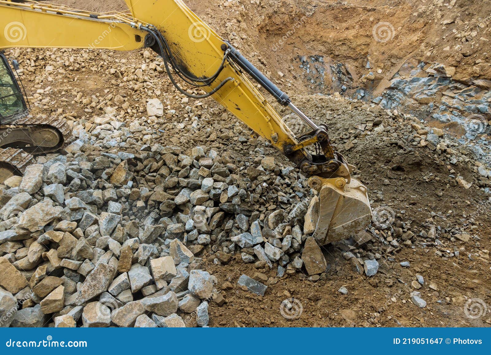 Preparation for Road Construction Excavator Work with a Stone on Under ...