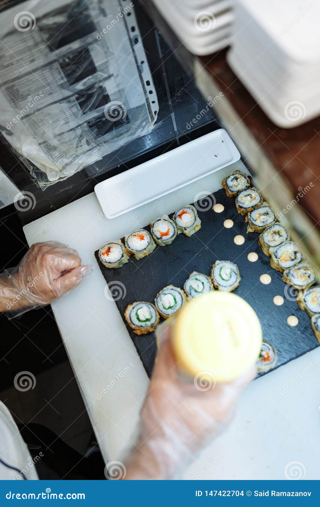 Preparation of Rolls on a Board on the Table in the Kitchen of the ...