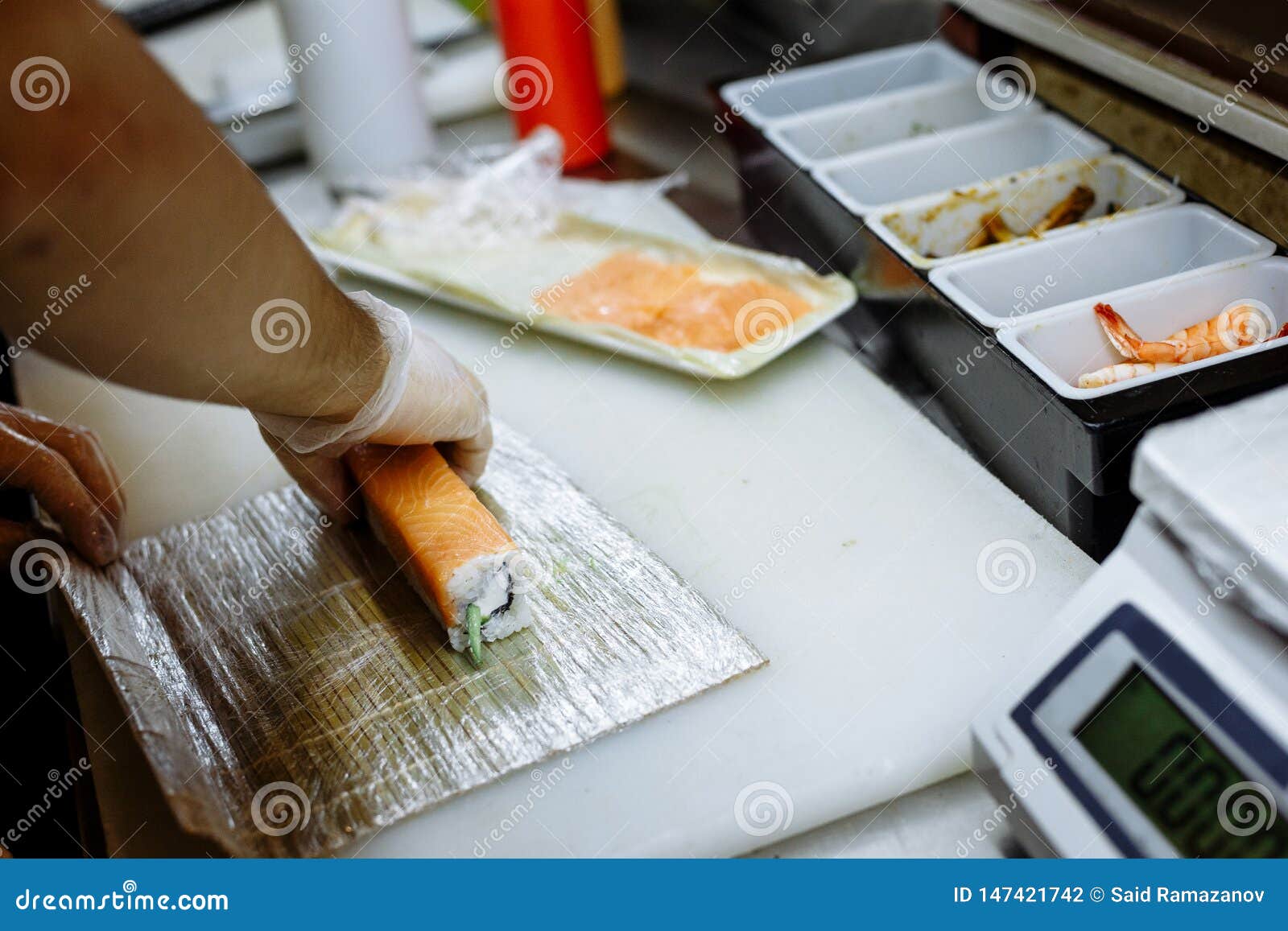 Preparation of Rolls on a Board on the Table in the Kitchen of the ...
