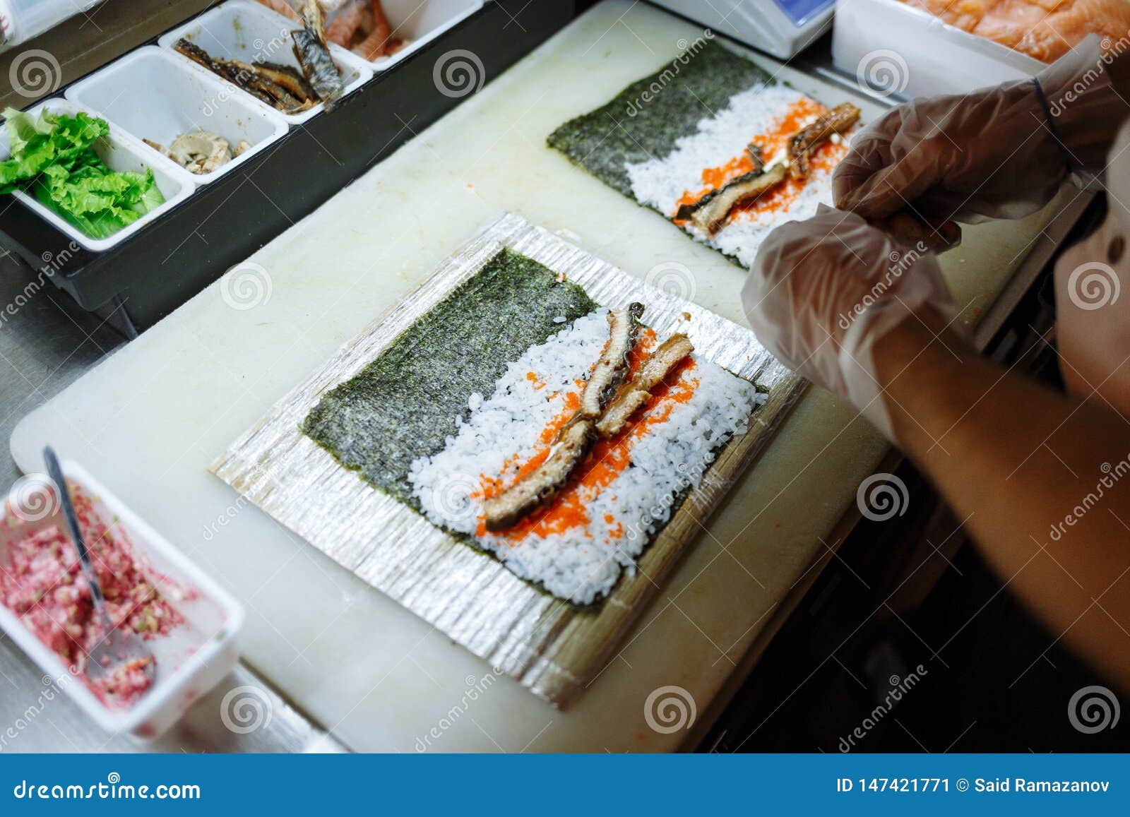 Preparation of Rolls on a Board on the Table in the Kitchen of the ...